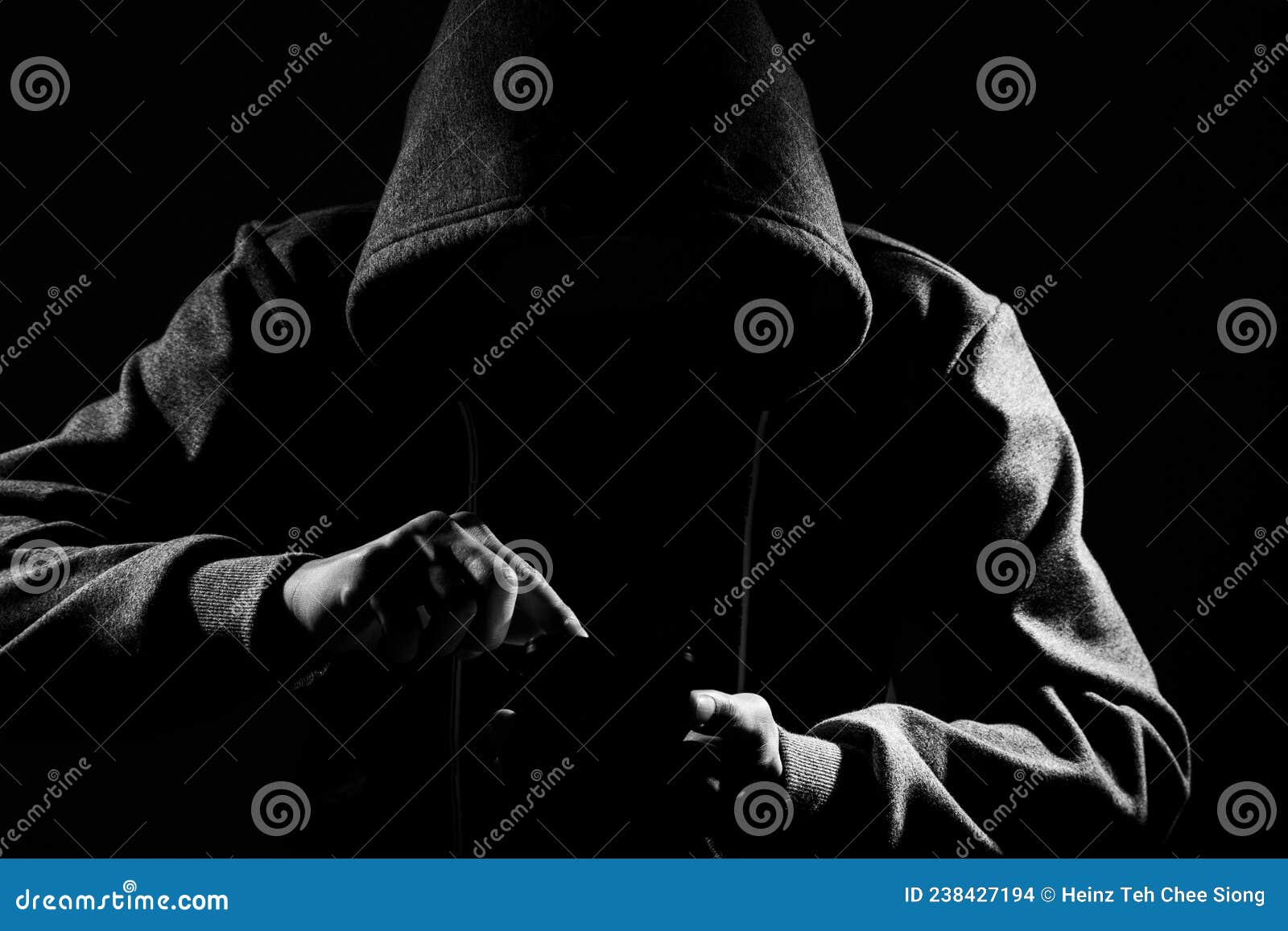 Hacker Using Smartphone. Men in Black Clothes with Hidden Face Stock ...