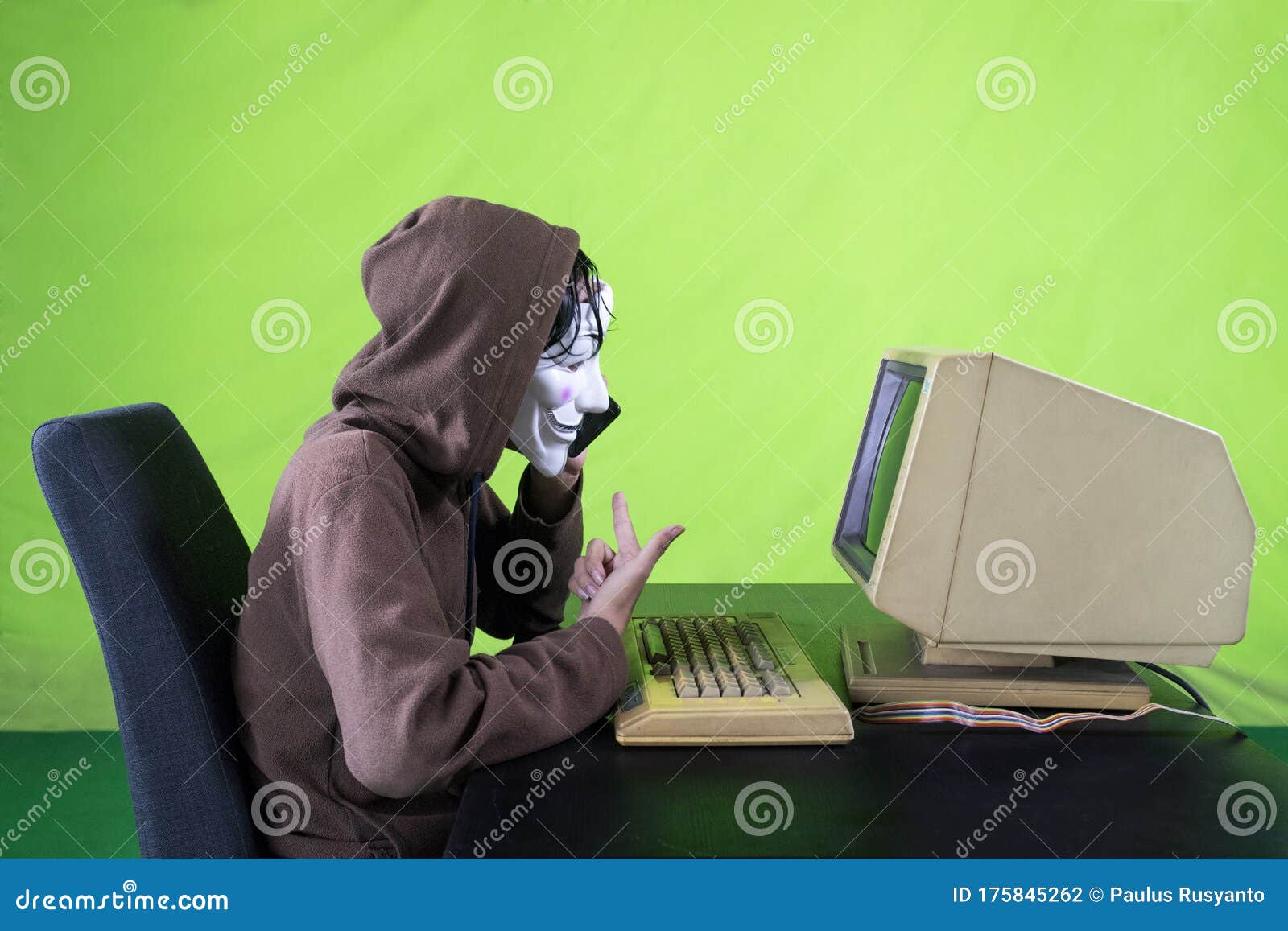 Hacker in Vendetta Mask Talking on Cellphone Editorial Photography ...