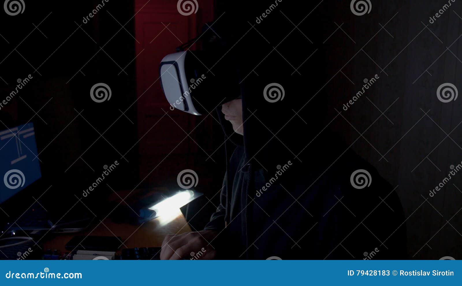 Hacker in VR Glasses Cracking Code Using Computers in Dark Room Stock ...