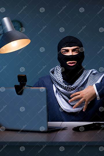 The Hacker Wearing Balaclava Mask Hacking Computer Stock Photo - Image of malicious, dark: 116479076