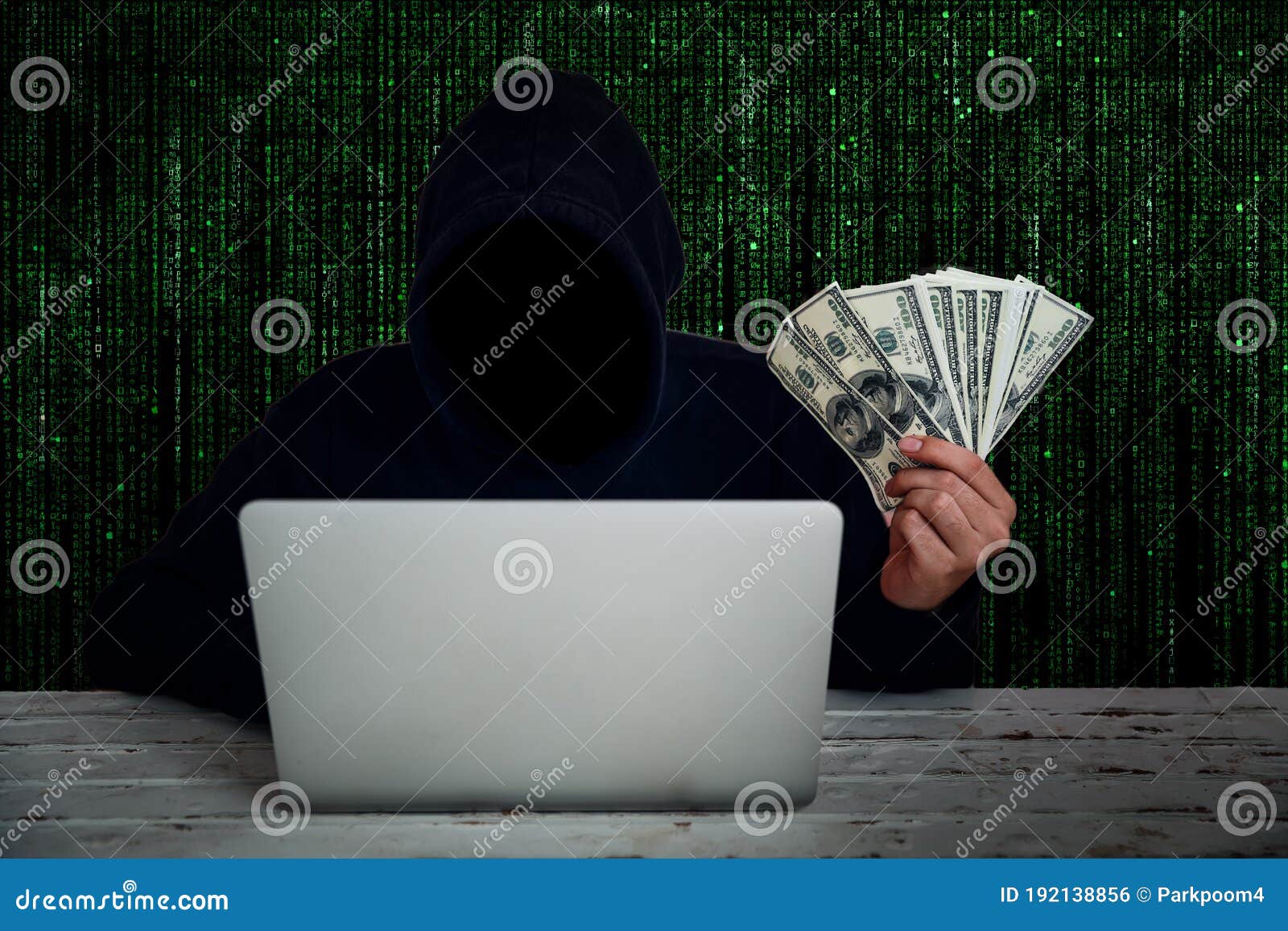 Hacker Wearing Black Hooded with Computer Hacking Data and Showing ...