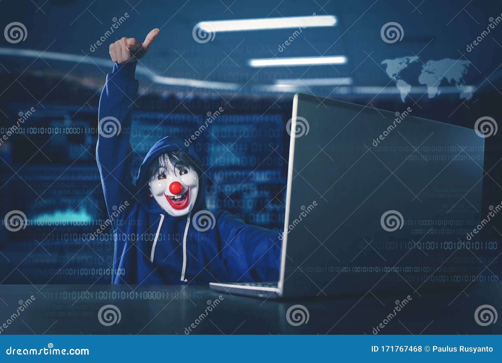 Hacker Wearing Clown Mask Threatening and Facing Camera Stock Photo ...