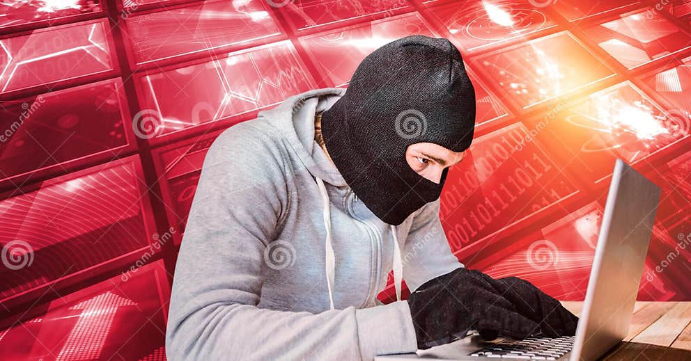 Hacker Wearing Monkey Cap while Using Laptop Stock Photo - Image of ...