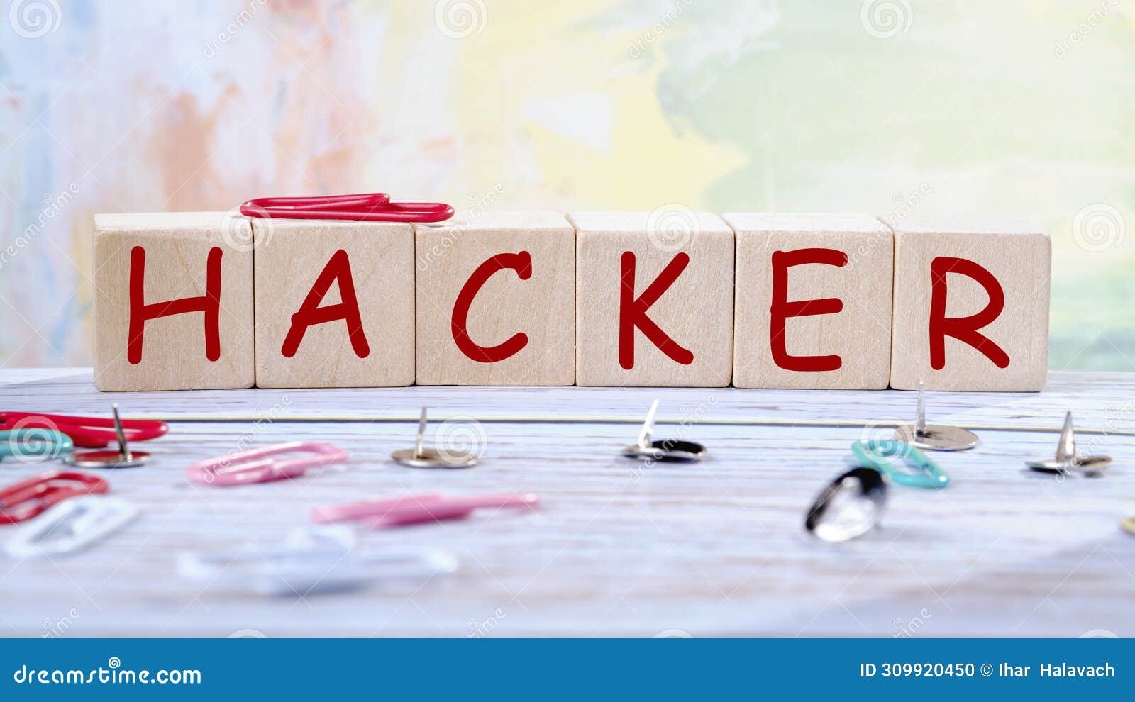 Hacker Word Assembled from Wooden Cubes on a Colored Background Stock ...