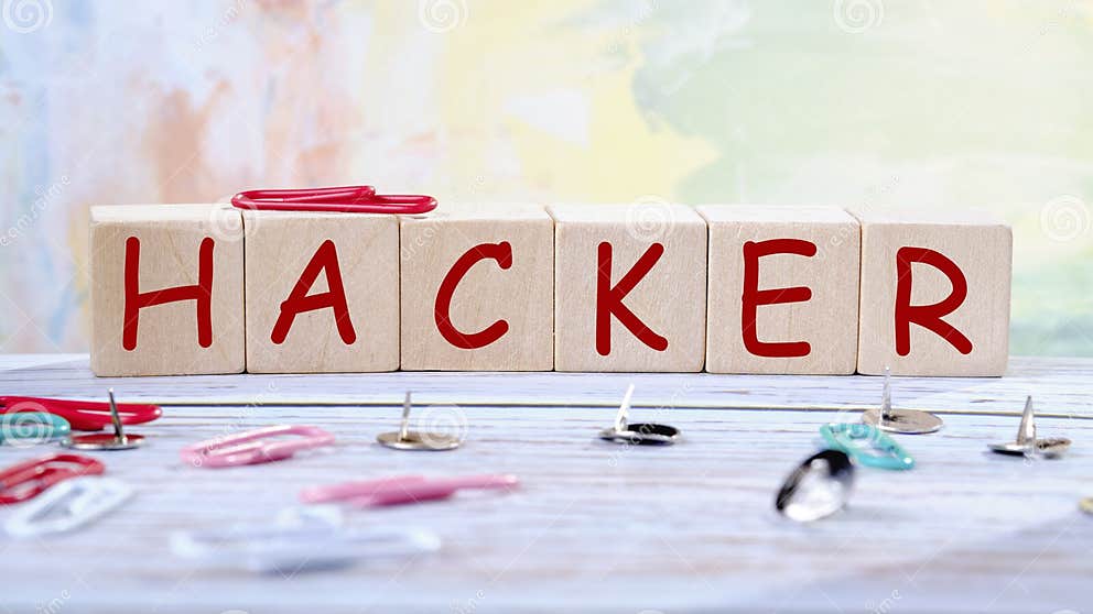 Hacker Word Assembled from Wooden Cubes on a Colored Background Stock ...