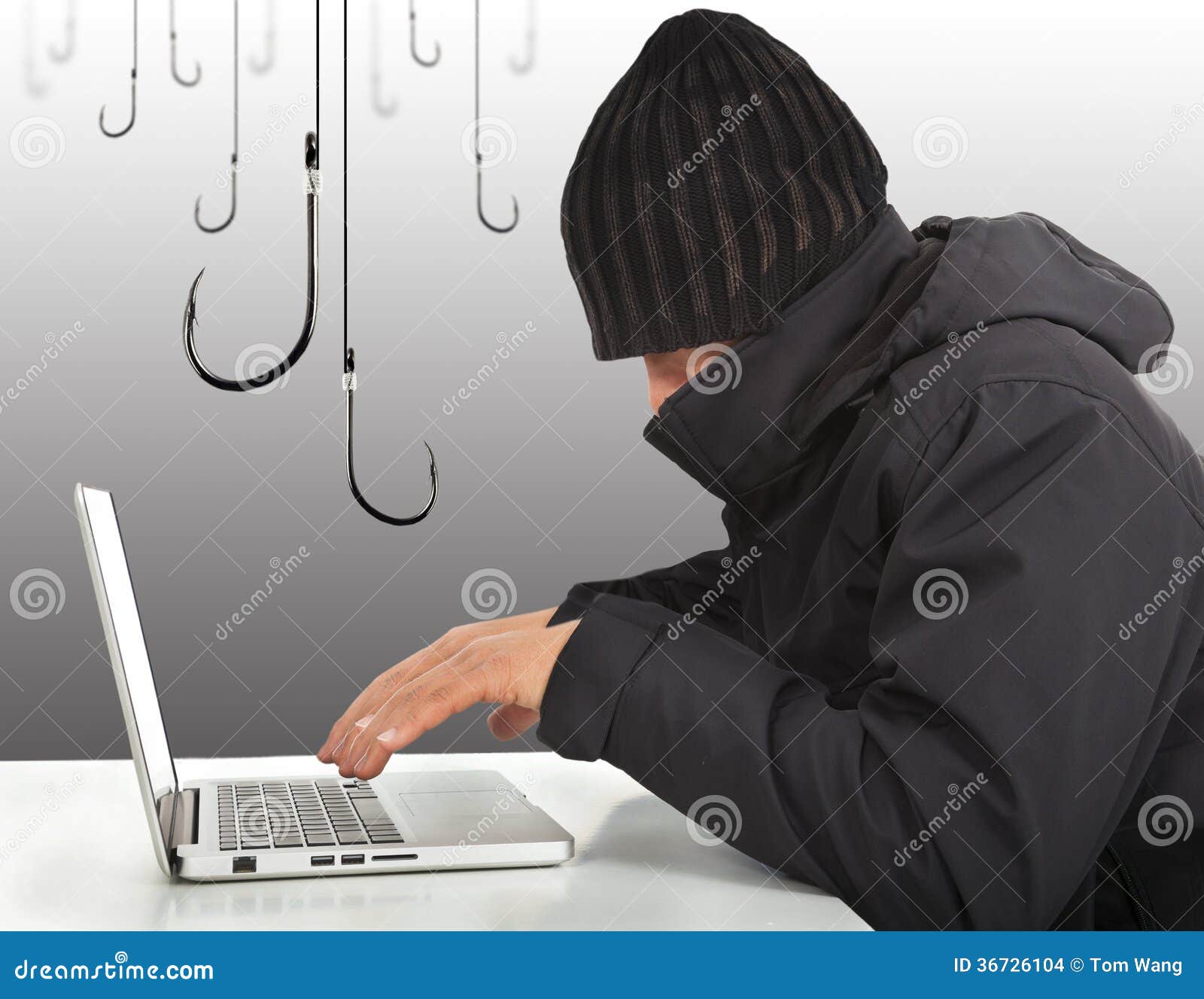 Hacker Working with a Laptop Computer and Hooks Stock Photo - Image of ...