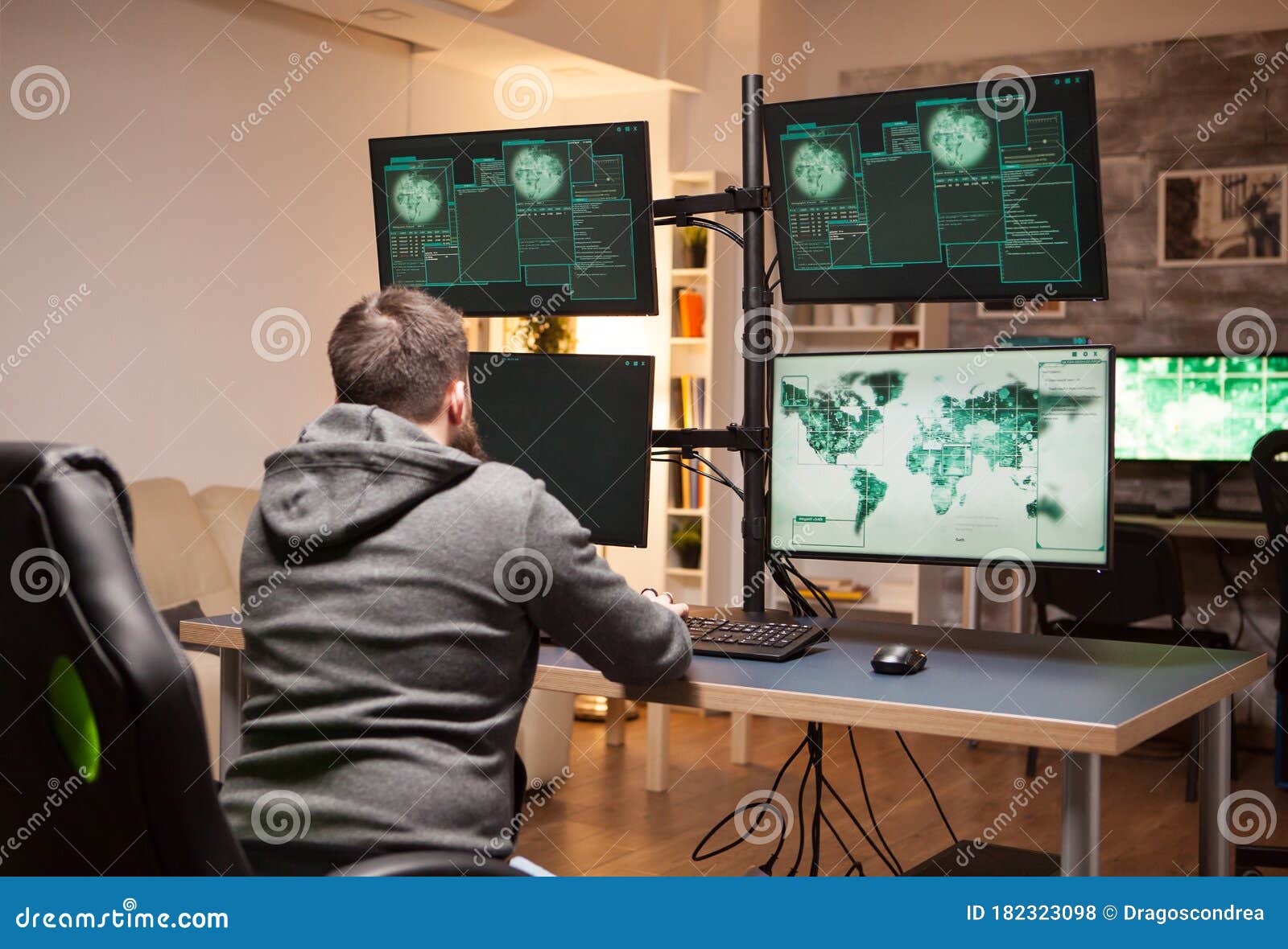 Hacker Writing His Hacking Code on Computer with Multiple Screens Stock ...
