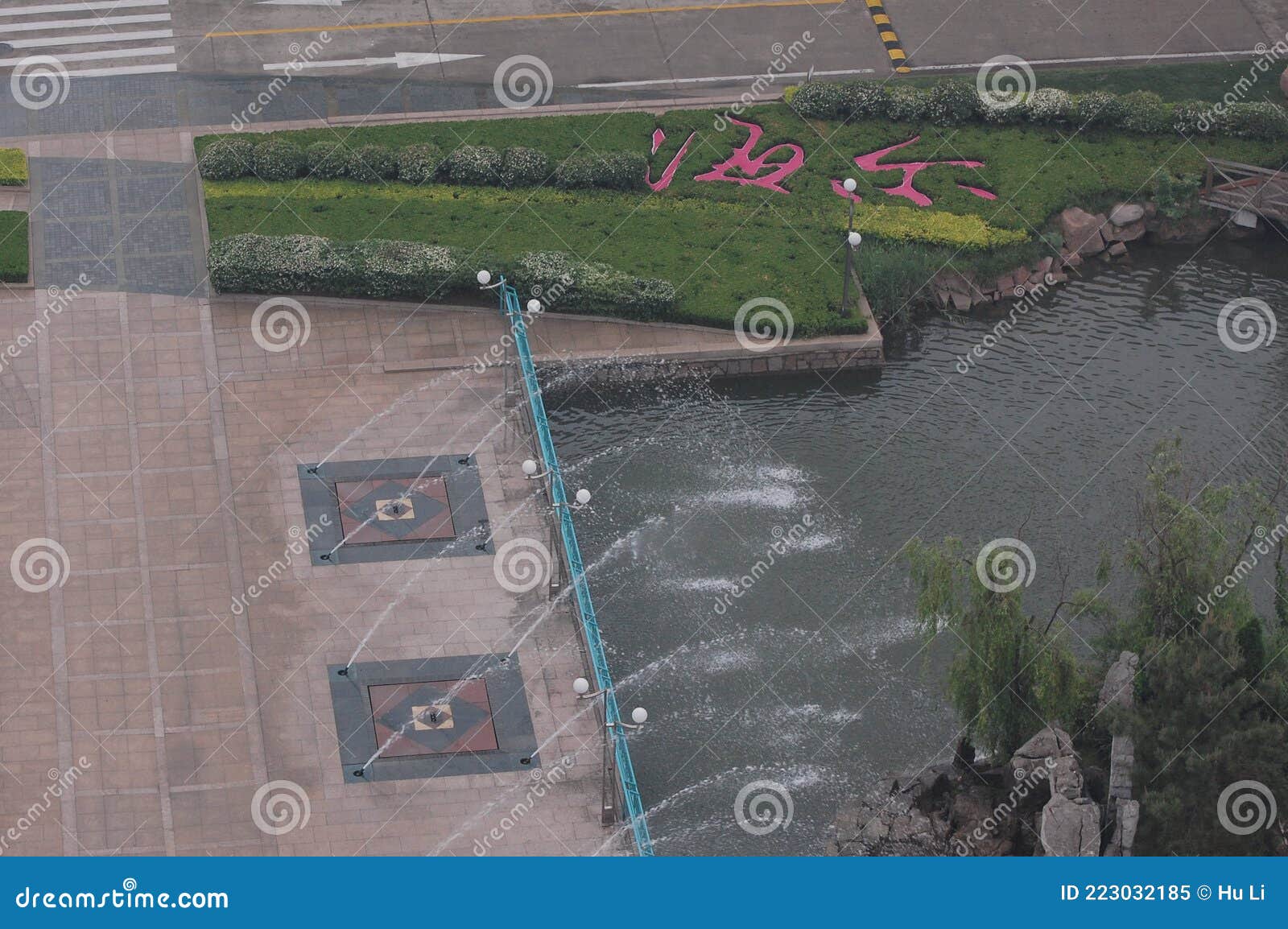 Haier logo on the grass stock image. Image of wall, water - 223032185