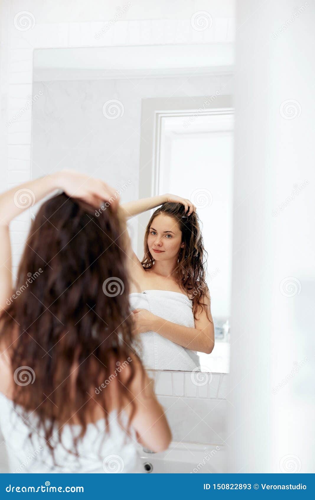 Hair And Body Care Beautiful Young Woman Touching Her Wet Hair With