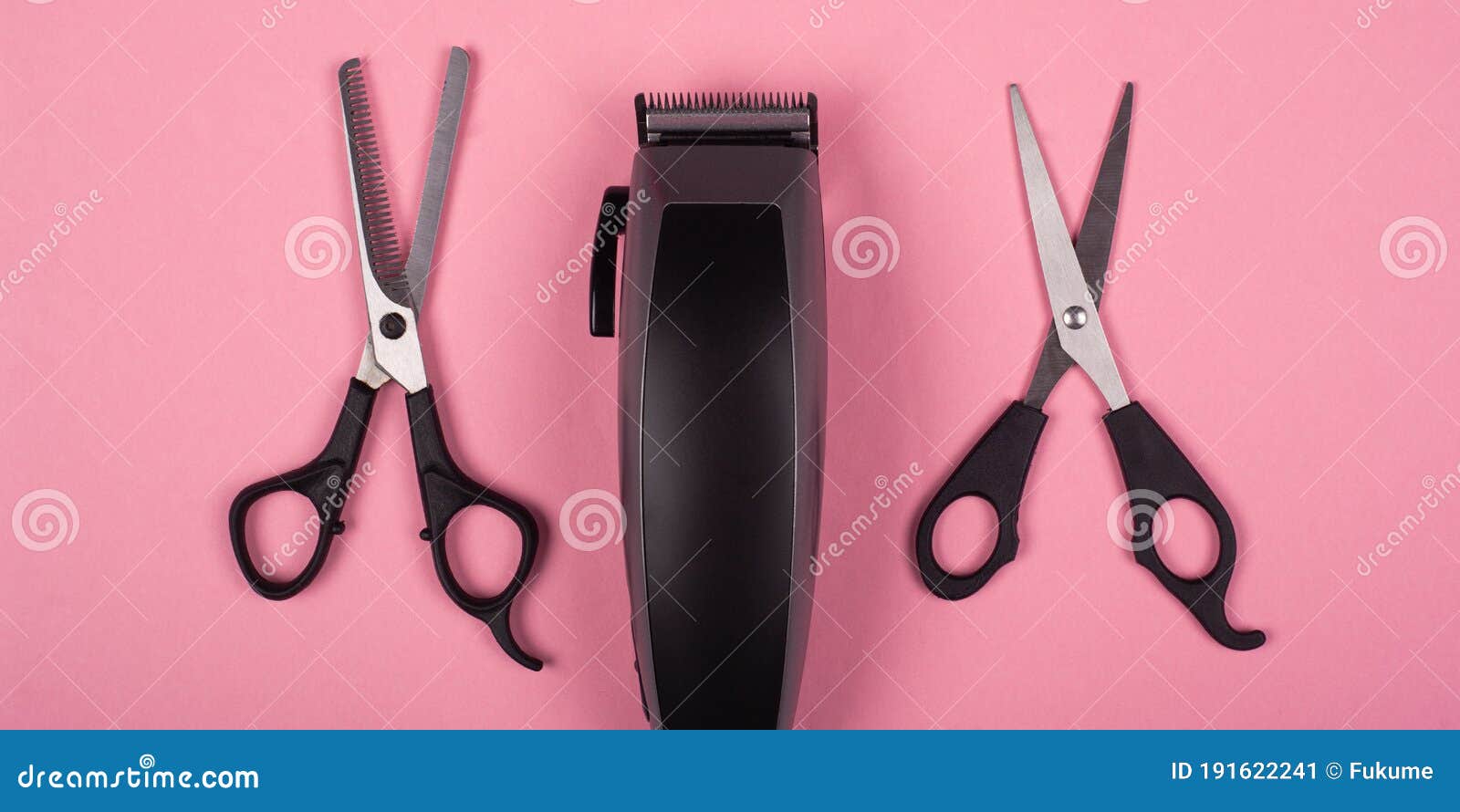 Hair Clipper and Scissors on a Pink Background, Hairdressing Tools ...