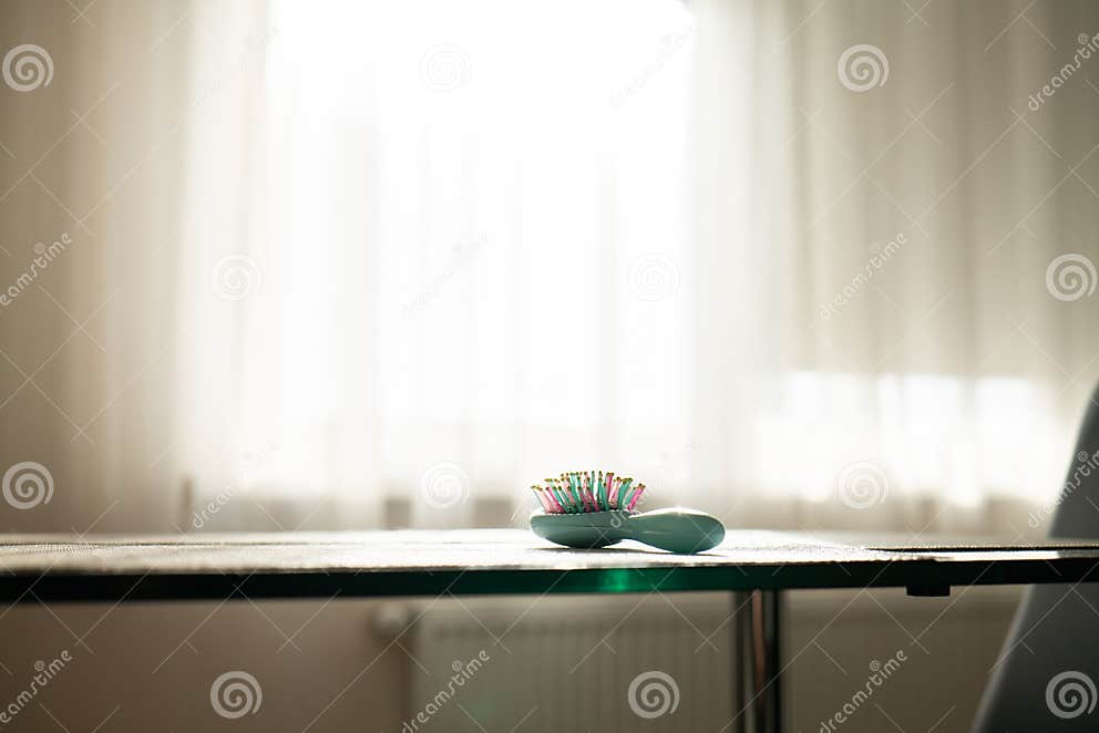 Hair Comb on Table. Hair Loss. Solutions for Hair Loss. Multicolored ...