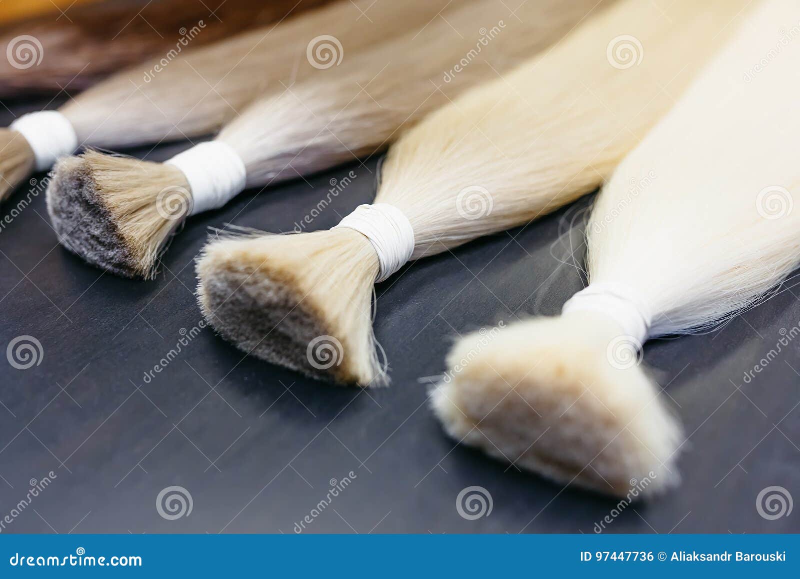 Hair Extensions of Five Colors on a Dark Background. Copyspace. Top ...