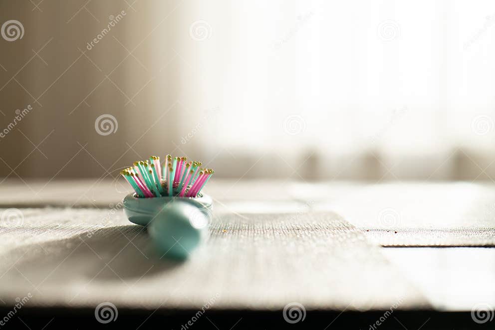 Hair Loss. Solutions for Hair Loss. Hair Comb on Table. Multicolored ...