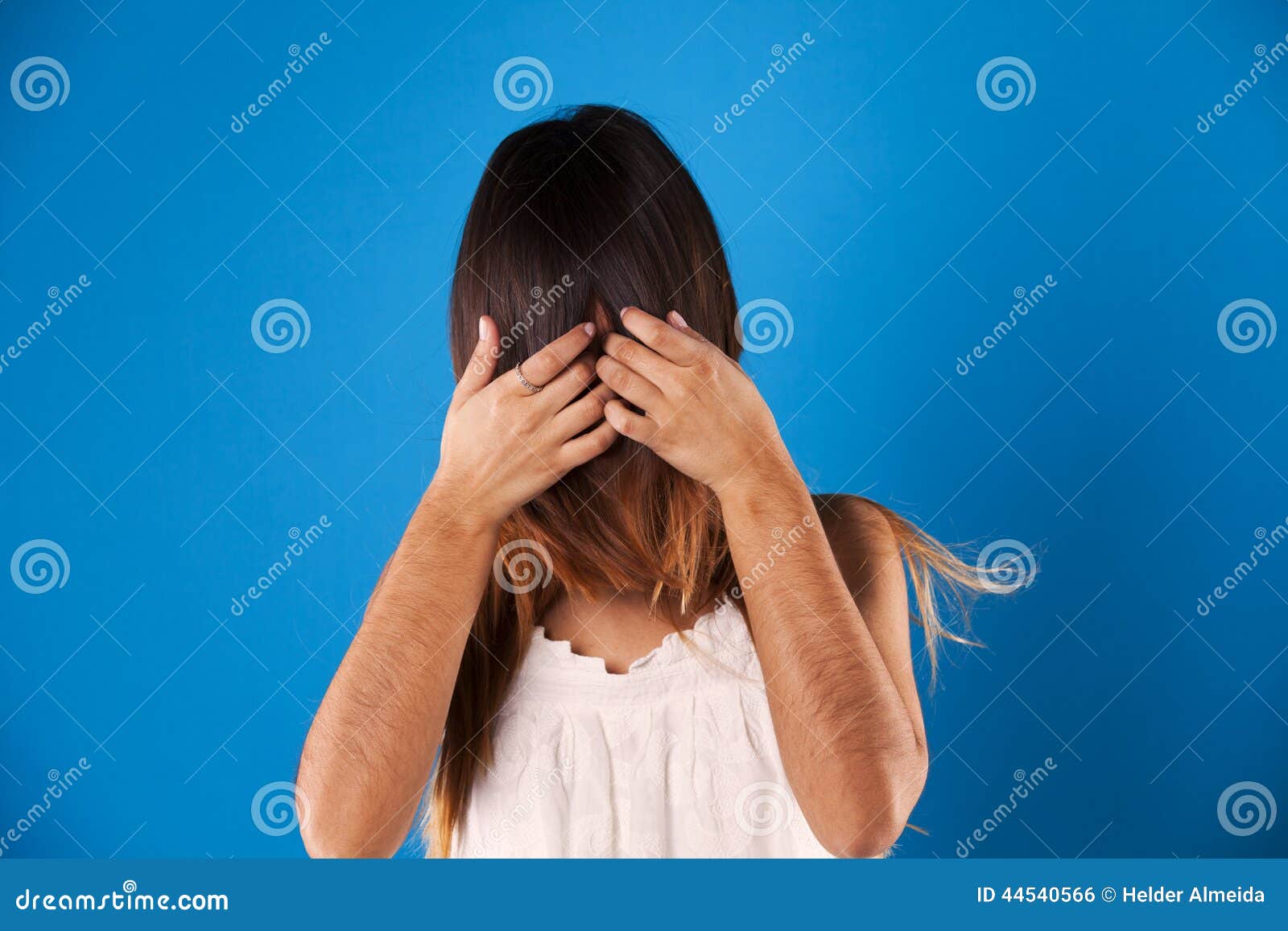 Hair over her face stock photo. Image of longhair, blue - 44540566