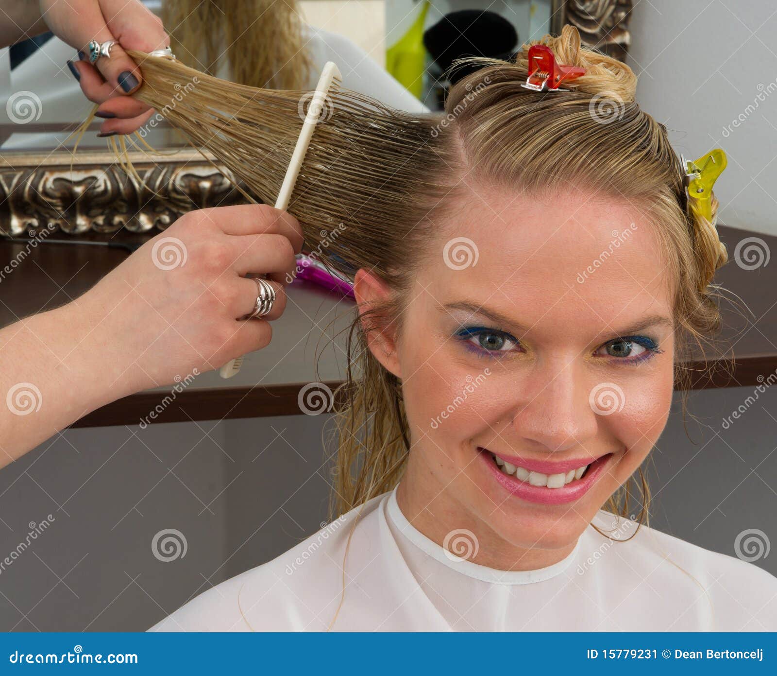 Hair stylist at work stock image. Image of salon, blond - 15779231