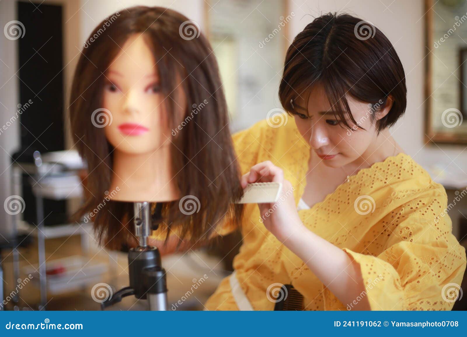 Hairdresser Practicing Hair Cutting Stock Photo - Image of teach ...