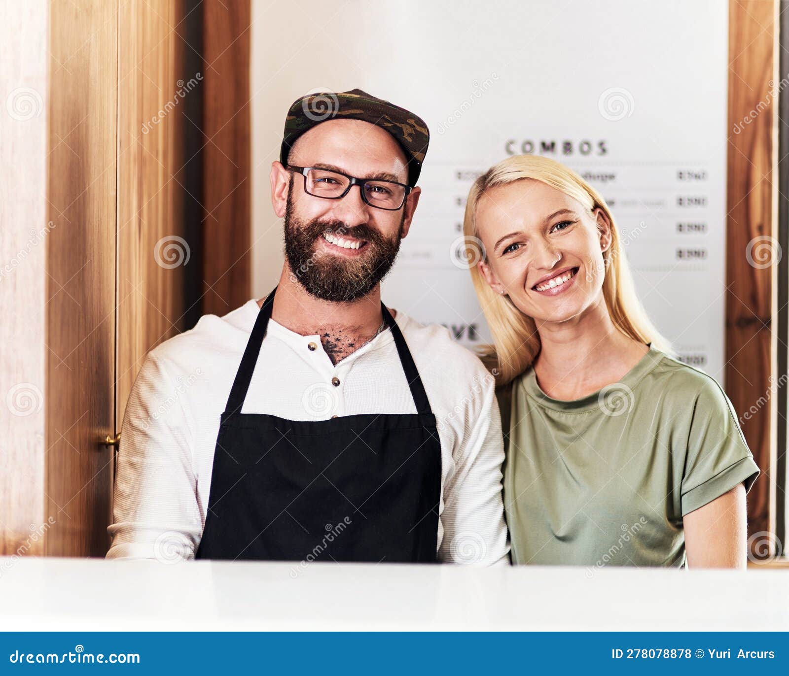 Hairdressing is Our Passion. Portrait of a Happy Young Barber and ... Hairdressing is Our Passion. Portrait of a Happy Young Barber and ...