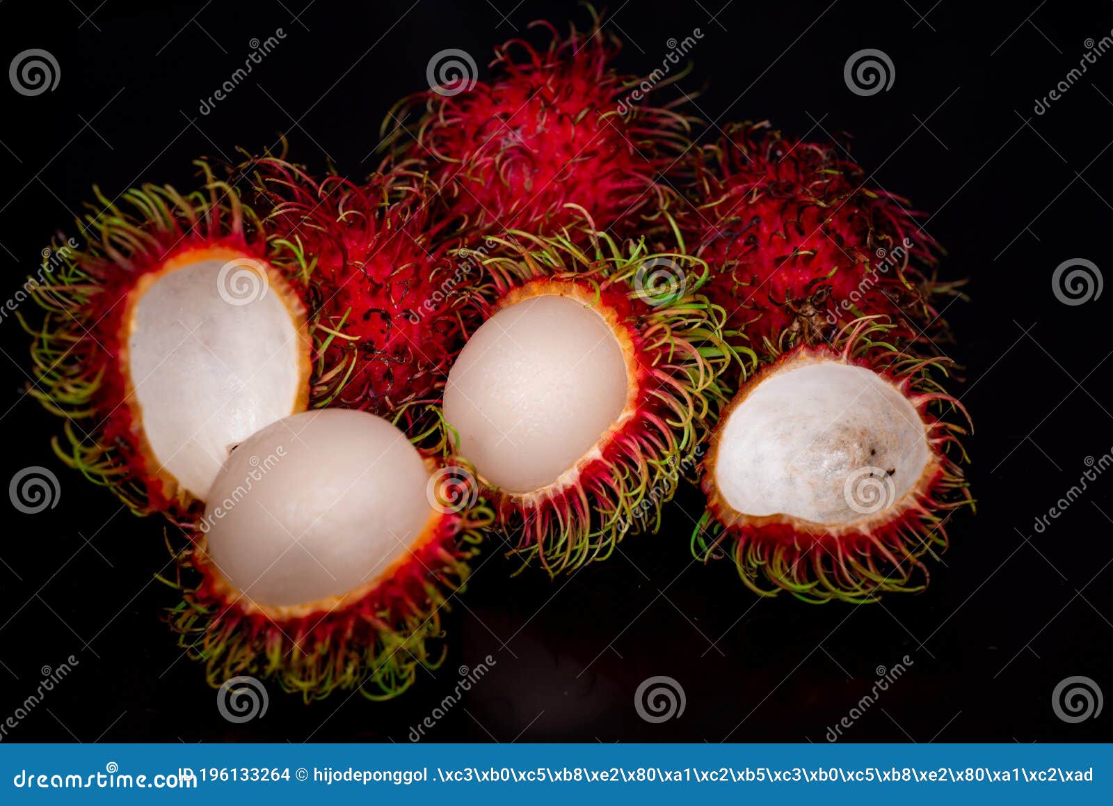 Hairy Red Rambutan Fruit in Black Background Stock Photo - Image of ...