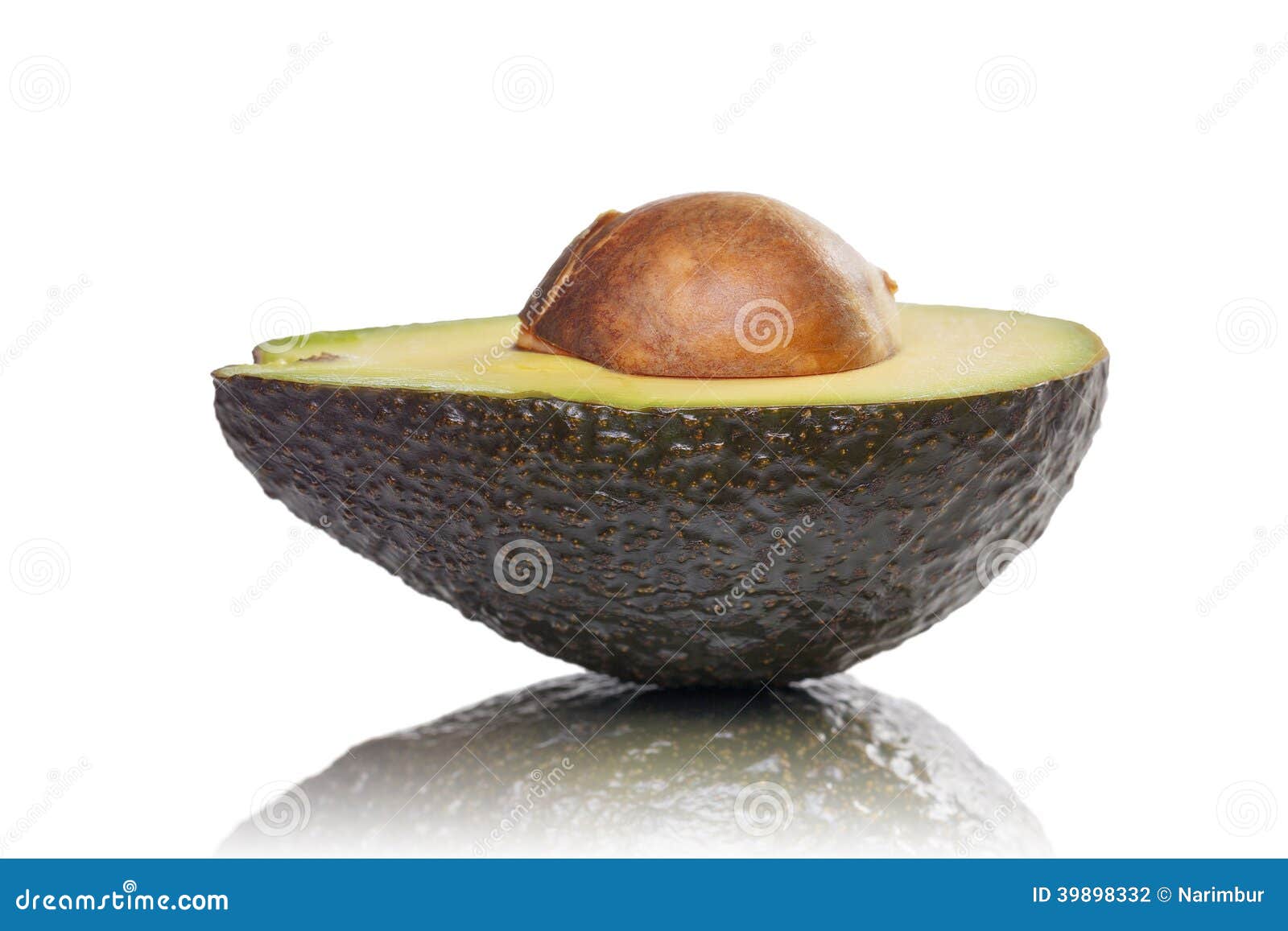 Half of an Avocado with Kernel and Reflection Stock Photo - Image of ...