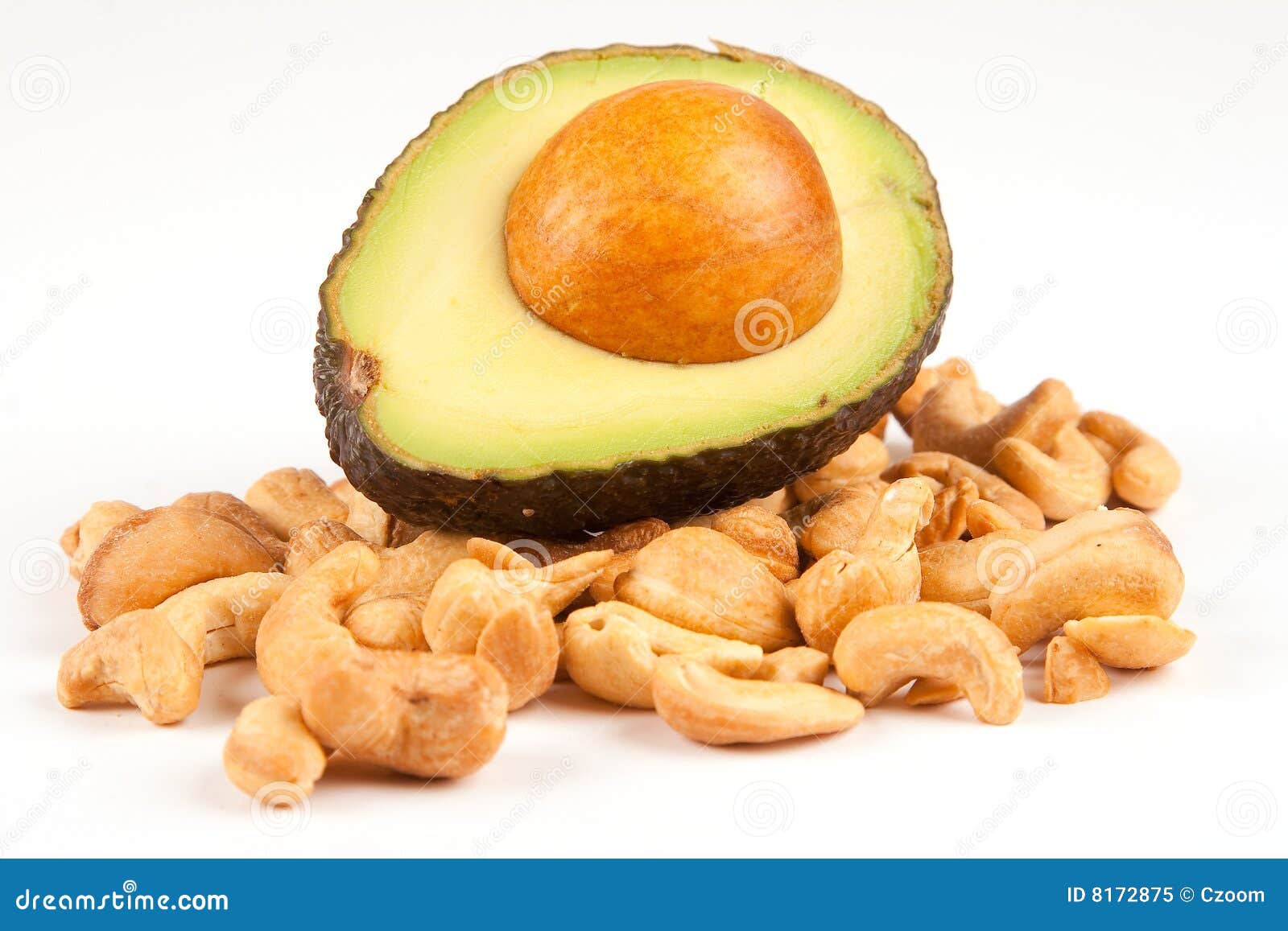 Half Avocado on Pile of Cashew Nuts Stock Image - Image of green ...