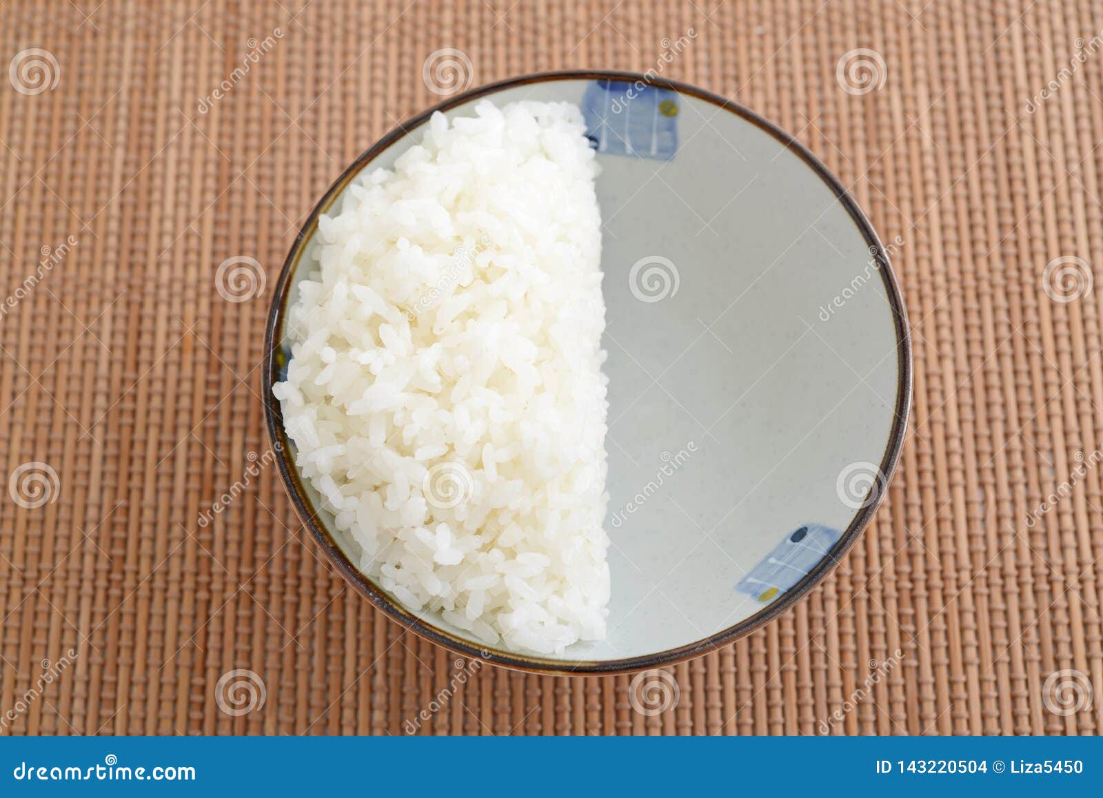 Half a bowl of rice. stock photo. Image of diet, isolated - 143220504