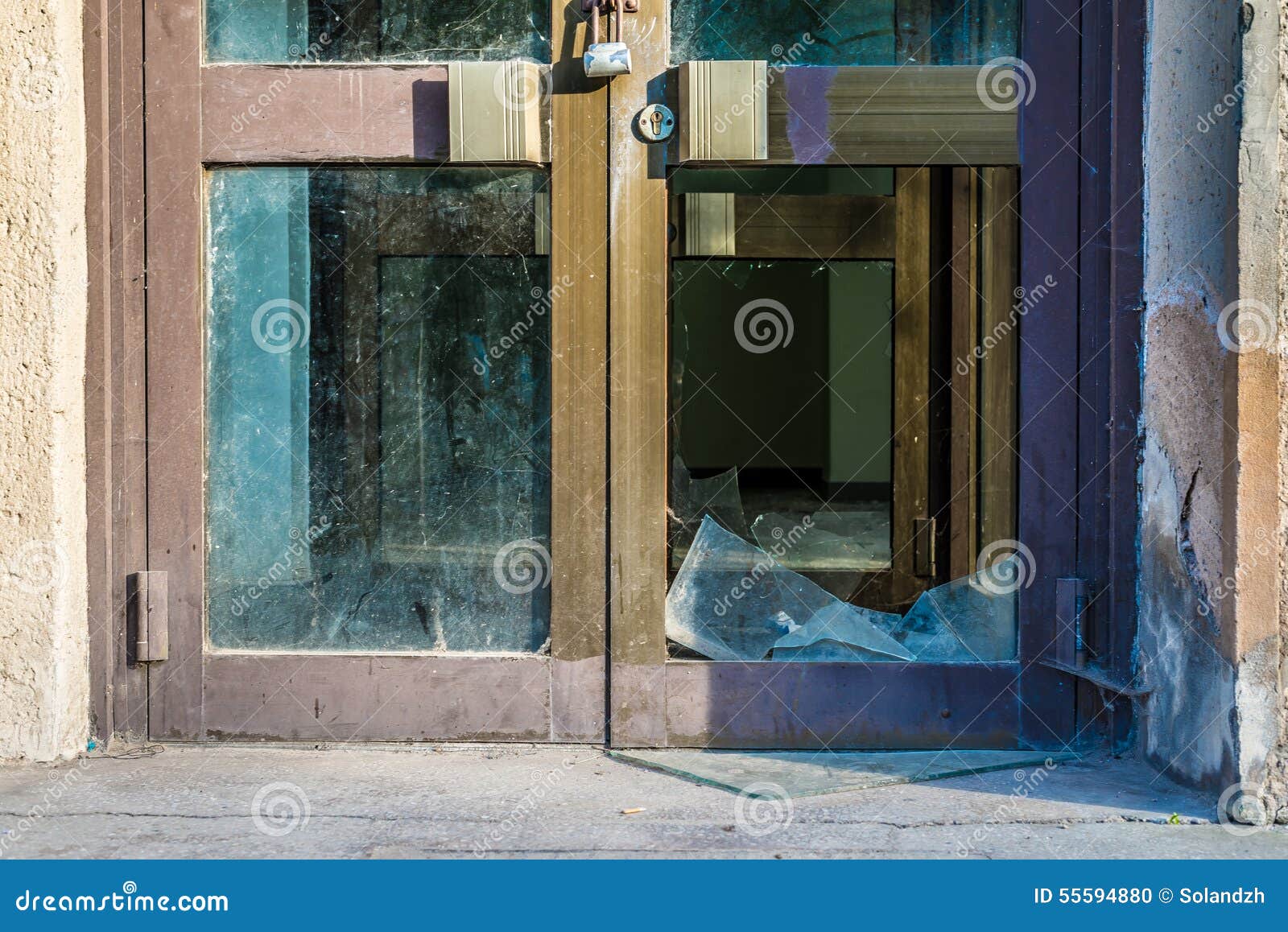 Half of Broken Old Glass Door with Steel Lock Stock Photo - Image of ...