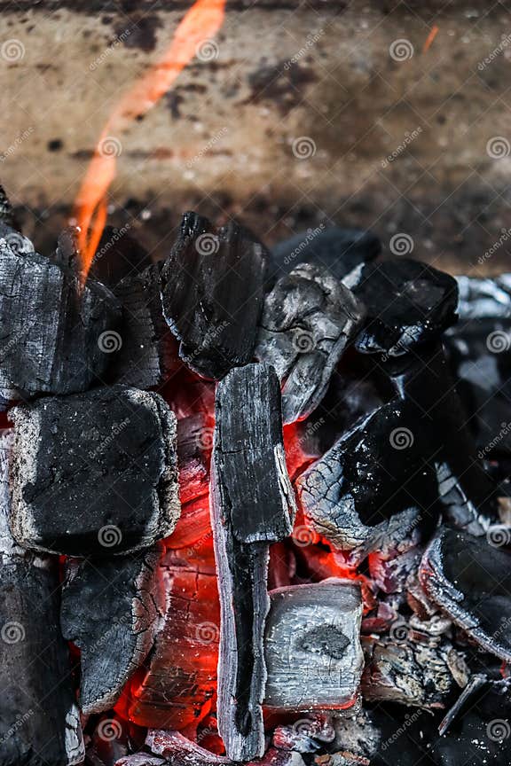 Half burned coal close up stock image. Image of background - 146053753