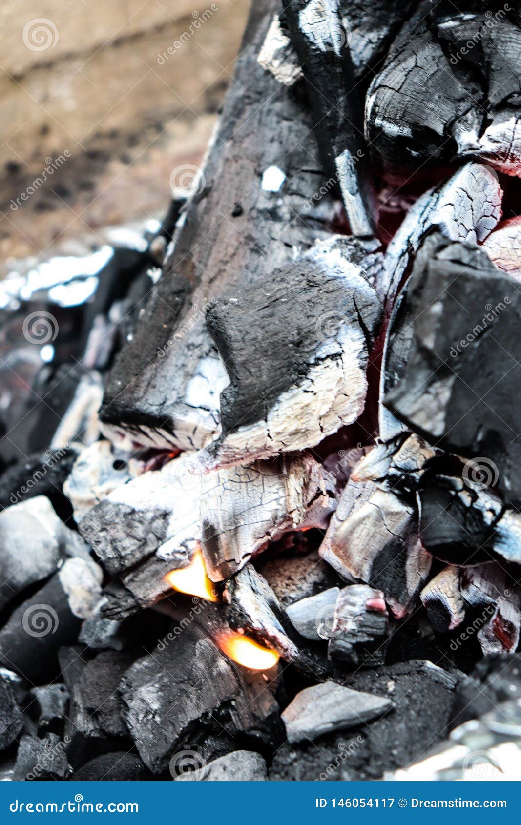 Half burned coal close up stock image. Image of light - 146054117