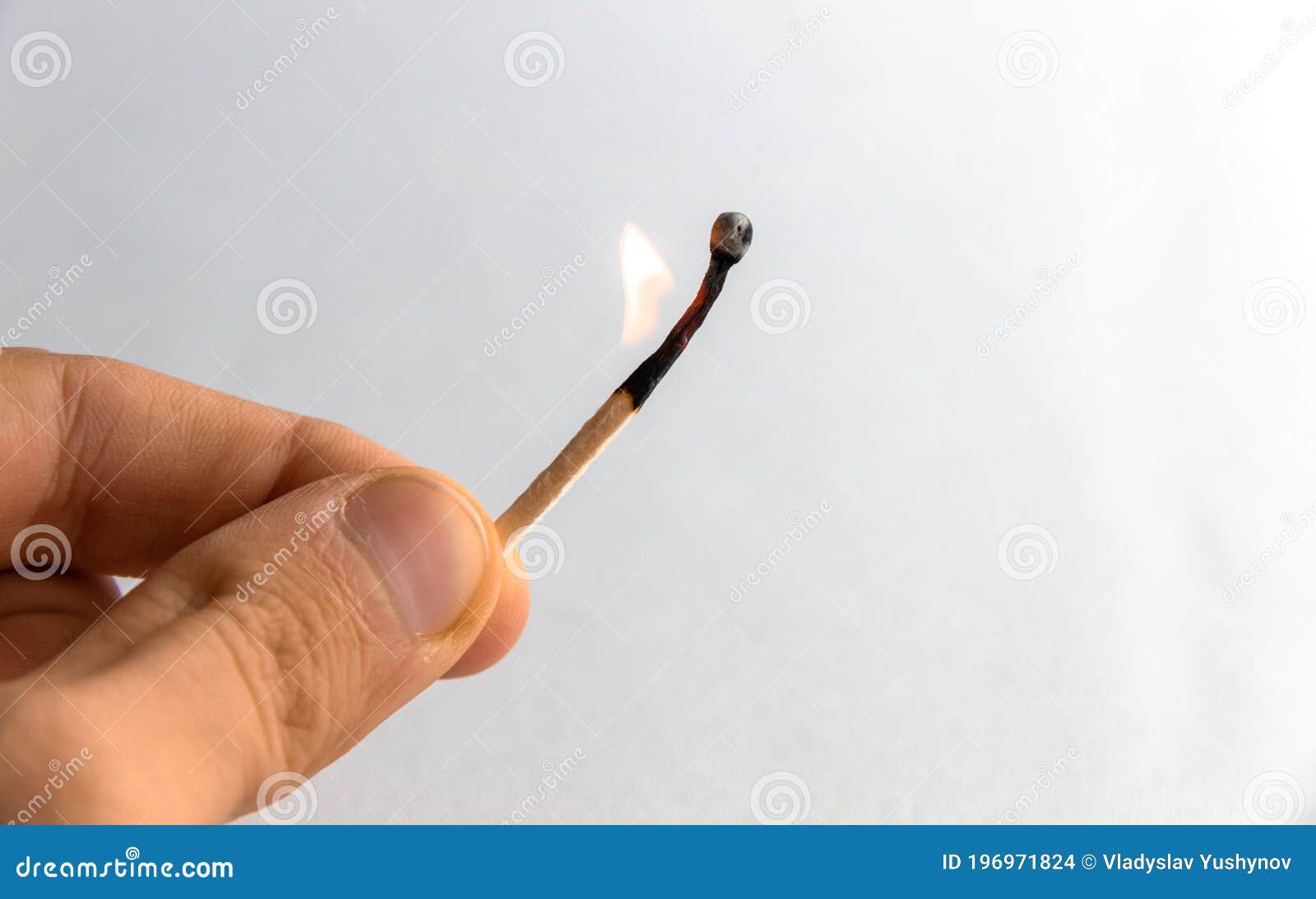 Lit Match In Hand. A Lit Match On A White Background. Lighted Match In ...