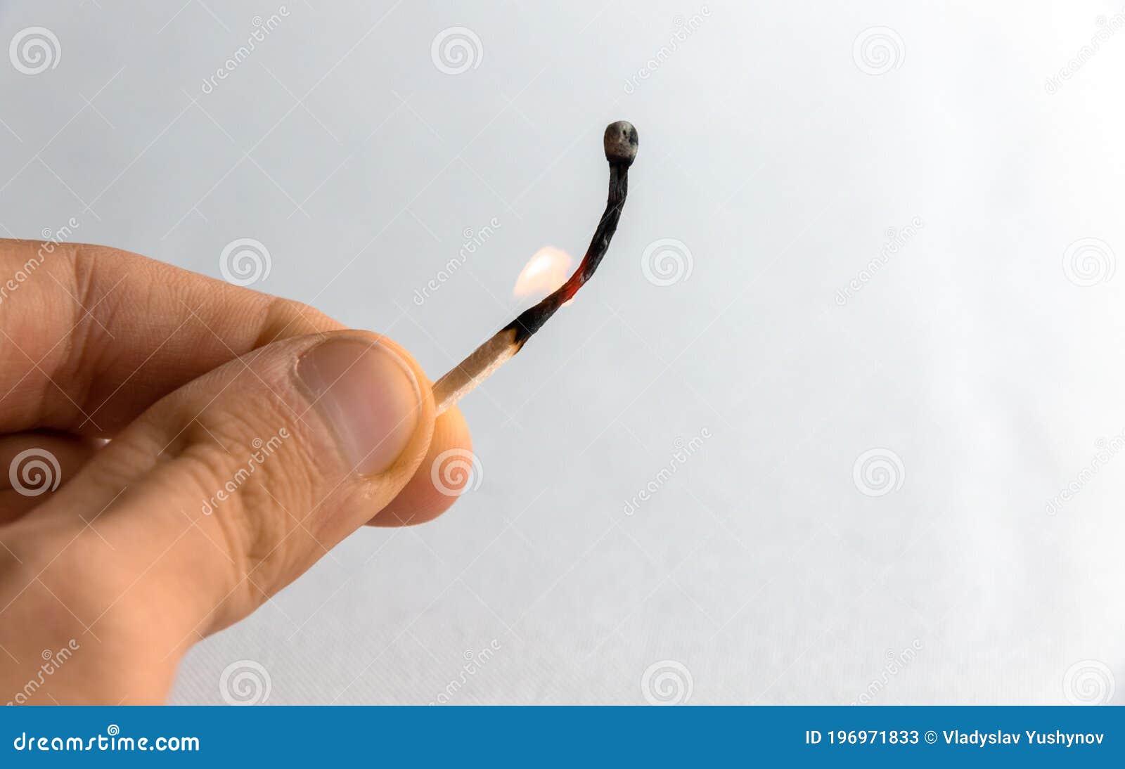 Half Burnt Match in Hand of Teenager on Plain White Background Stock ...