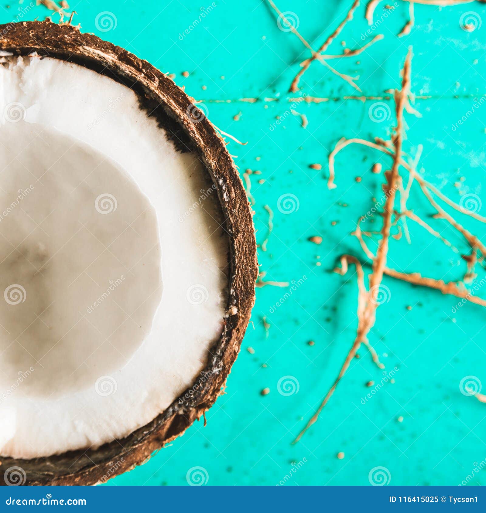 Half of Chopped Coconut on a Blue Background Stock Image - Image of ...