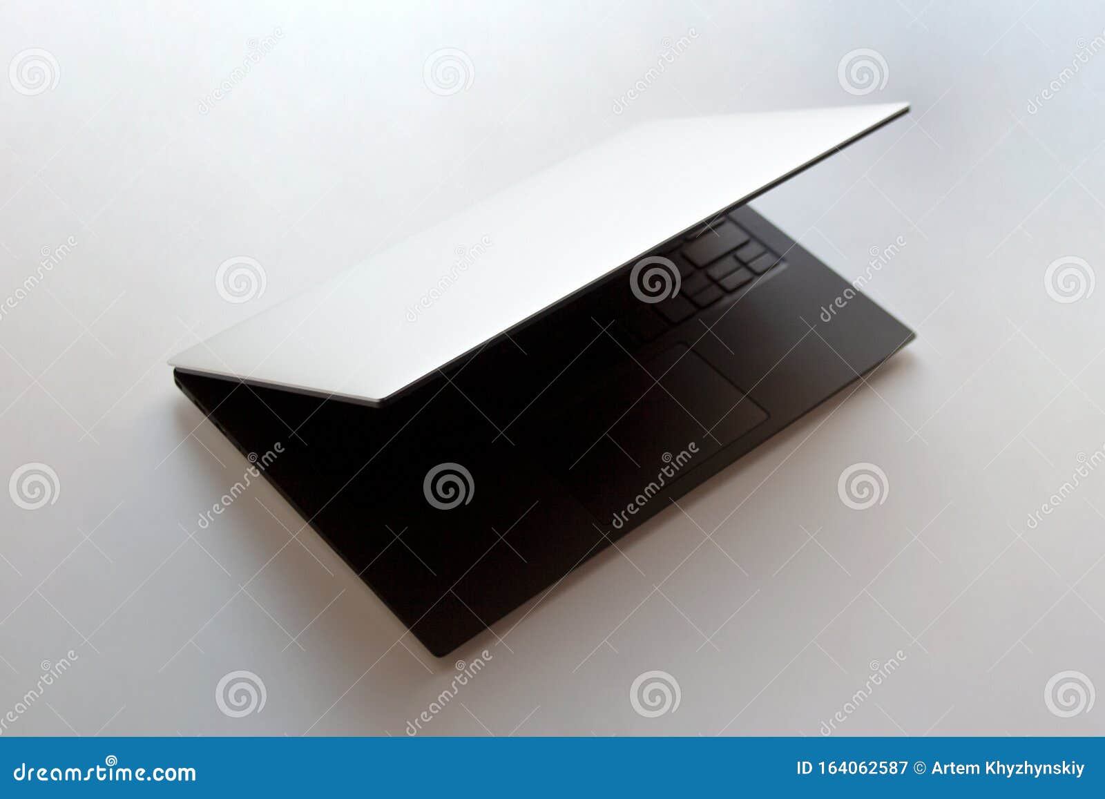Half Closed Laptop on White Background Stock Image - Image of abstract ...