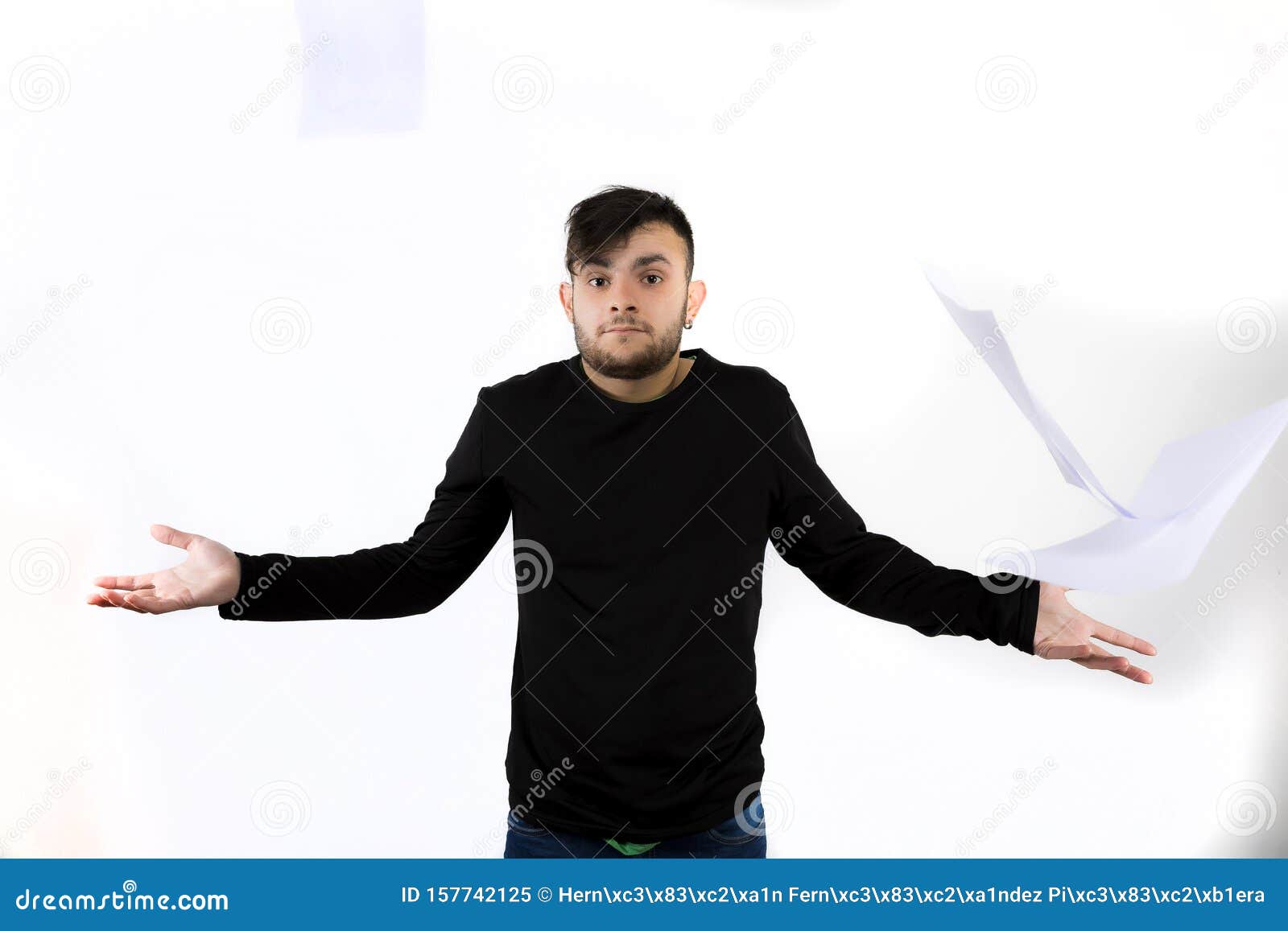Half Confused Man With Papers Flying Around Him Stock Photo ...