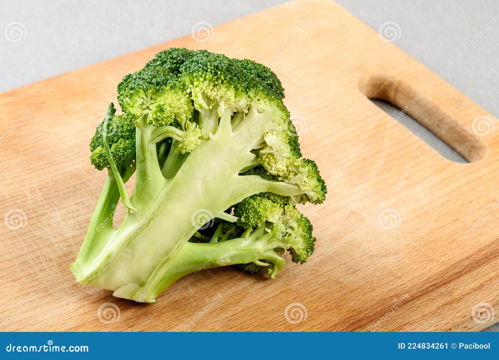 Cut in a Half Broccoli on the Kitchen Board Stock Image - Image of ...
