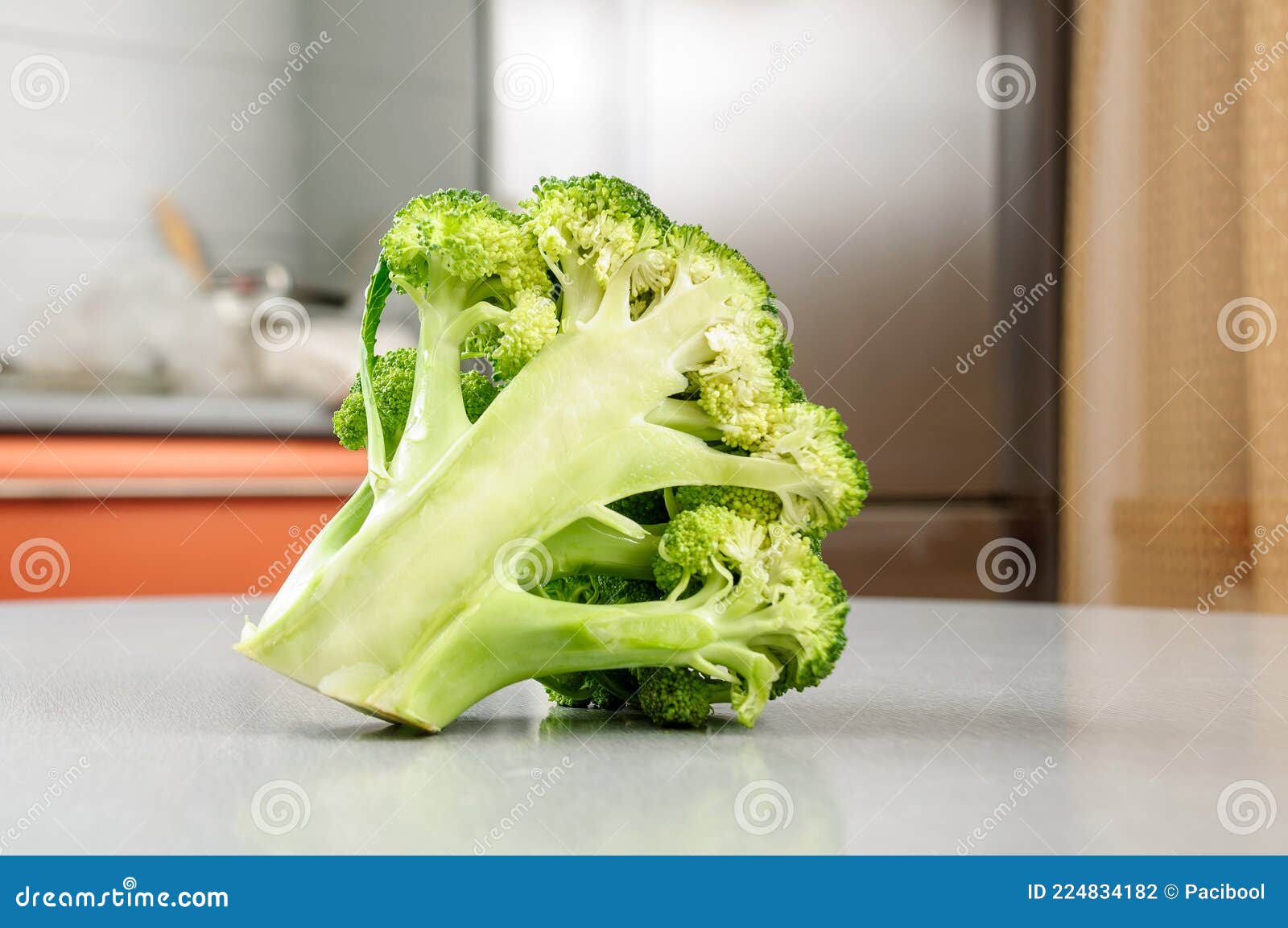 Cut in a Half Broccoli in the Kitchen Environment Stock Photo - Image ...