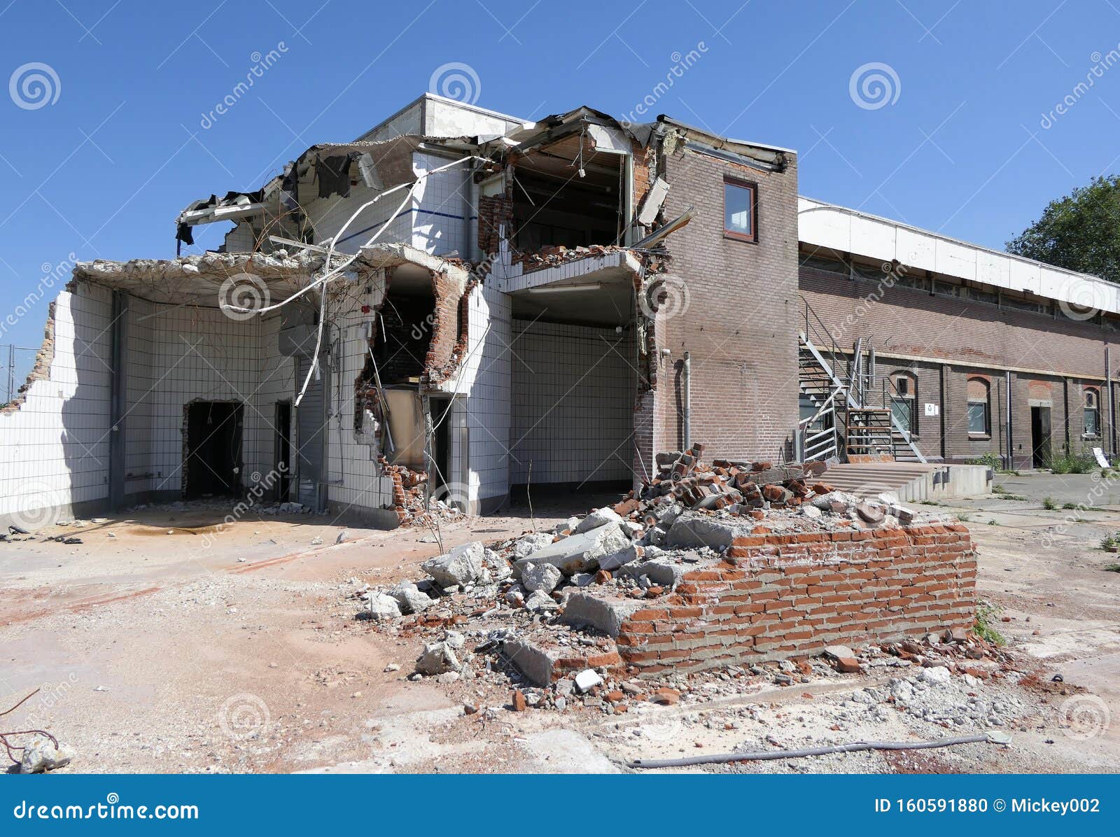 Half Demolished building stock photo. Image of debris - 160591880