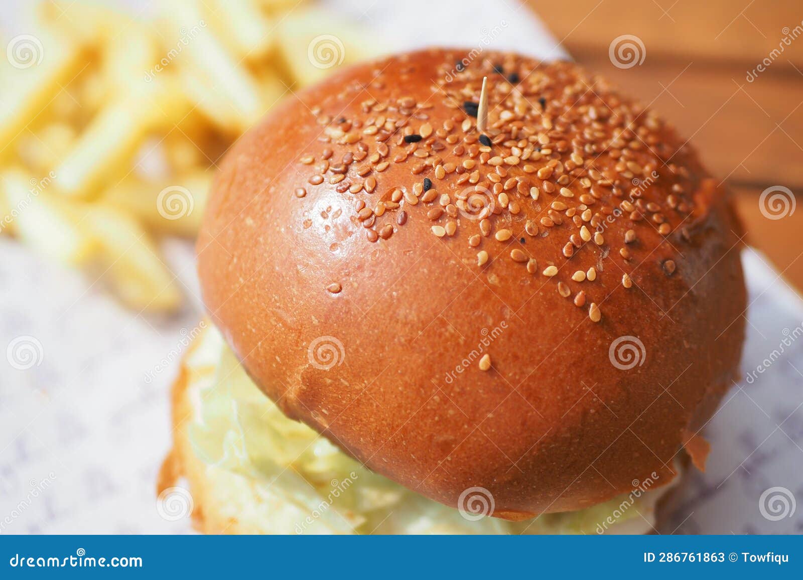 Half Eaten Beef Burger on Table Close Up Stock Image - Image of ...