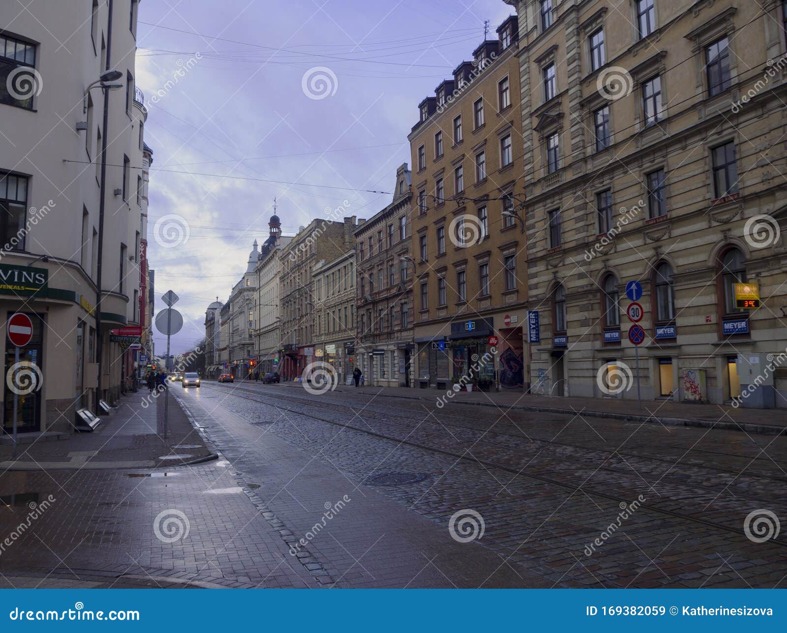 Half Empty Streets of Old Riga after Rain. View of the Carriageway and ...