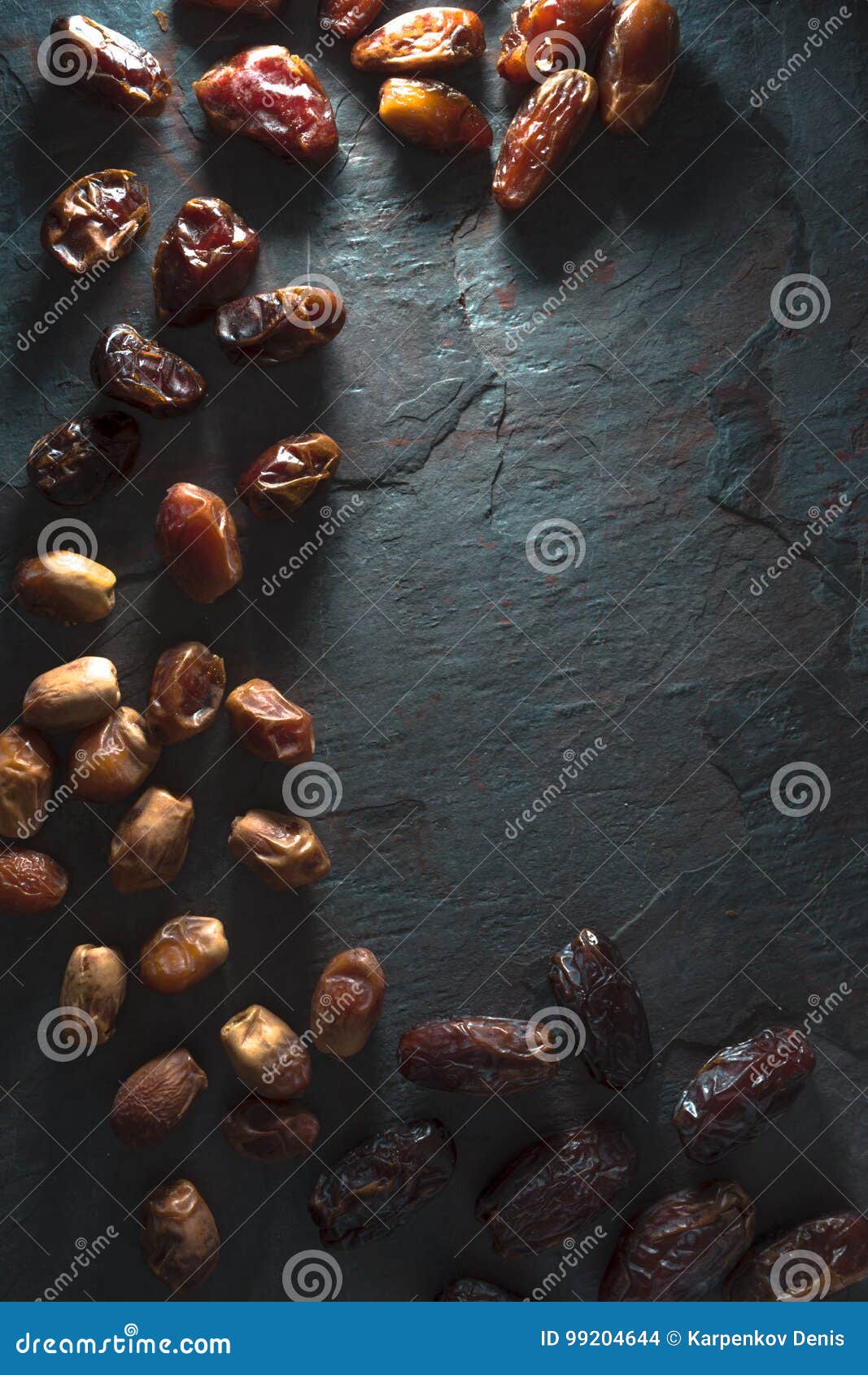 Half-frame of Dried Dates on a Gray Blue Table Stock Photo - Image of ...