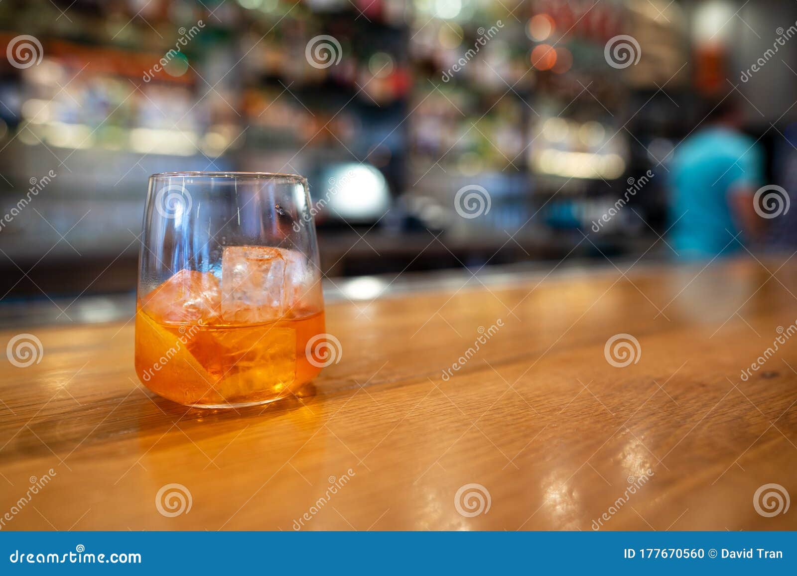 Half Full Empty Spritz Cocktail Drink on Counter in Bar Stock Photo ...