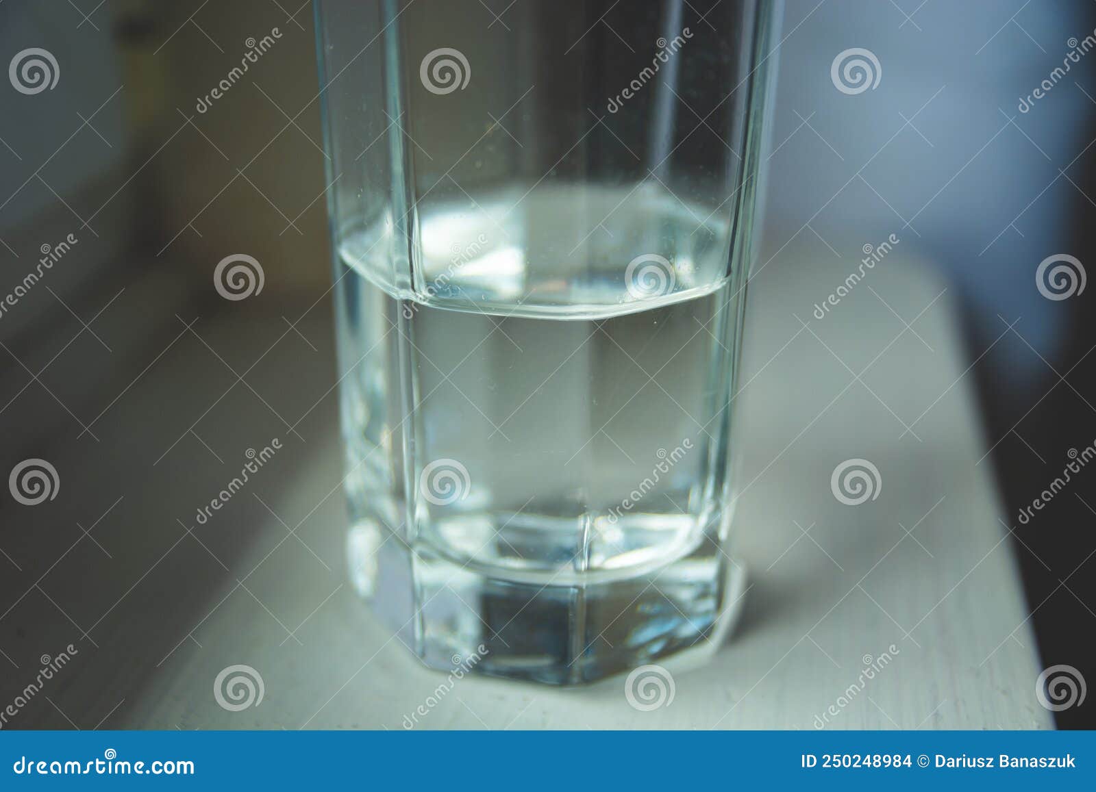 Half Glass of Water Standing on the Counter Stock Photo - Image of ...