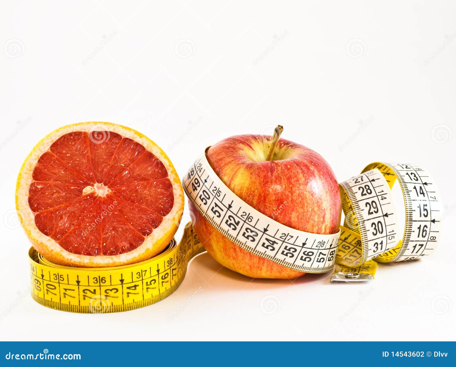 Half Grapefruit and Apple with Tape Measure Stock Photo - Image of ...