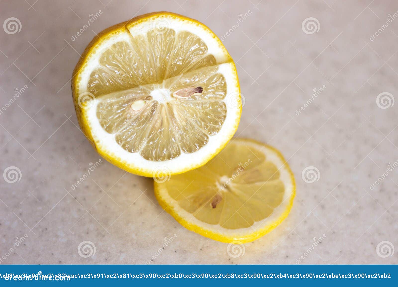 Half Lemon on a Grey Surface. Half a Lemon on a White Surface. Cut Half ...