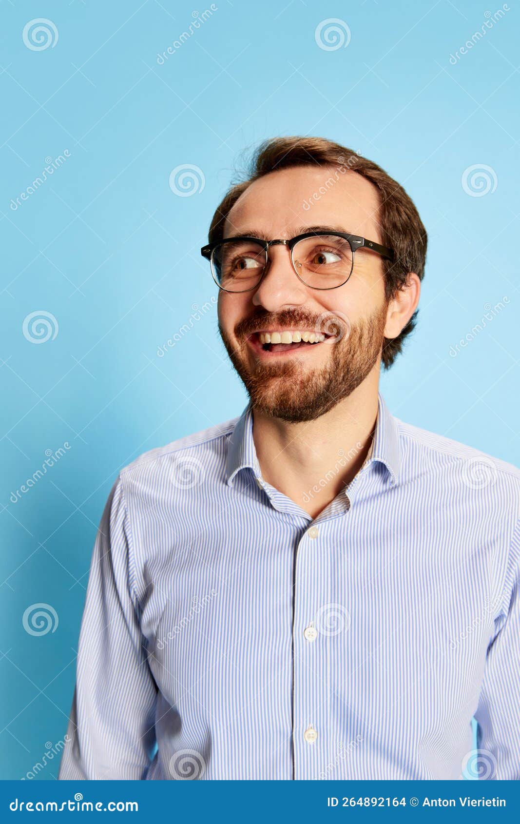 Half Length Portrait Of Mature Bearded Man In Eyewear Expressing Vivid
