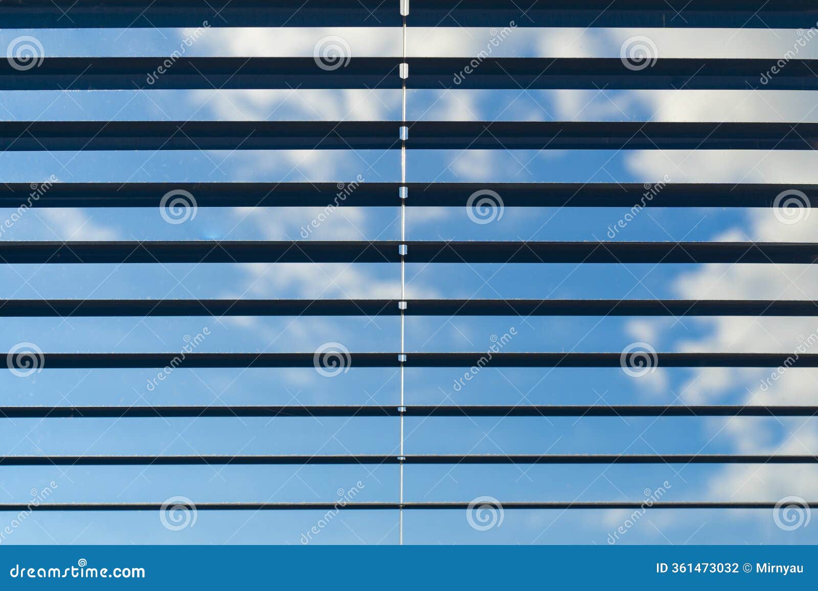 Half Lowered Window Blinds in Front of the Blue Sky Stock Photo - Image ...
