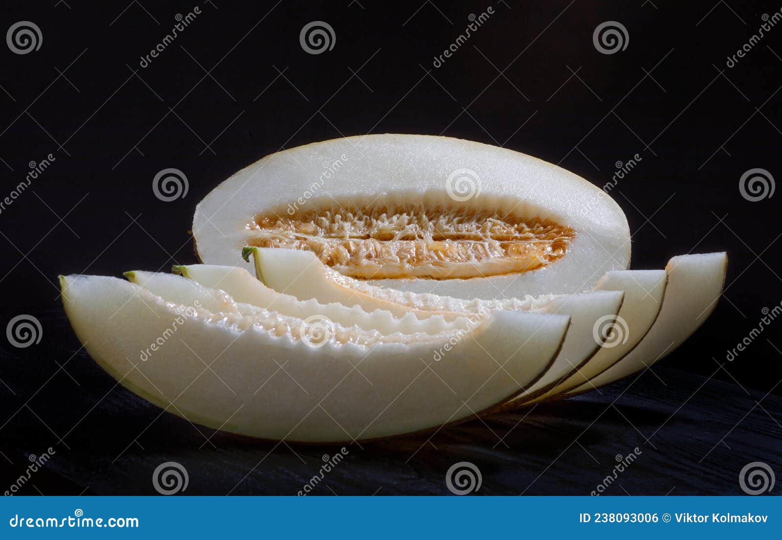 Half Melon and Sliced Pieces of Melon Stock Photo - Image of orange ...