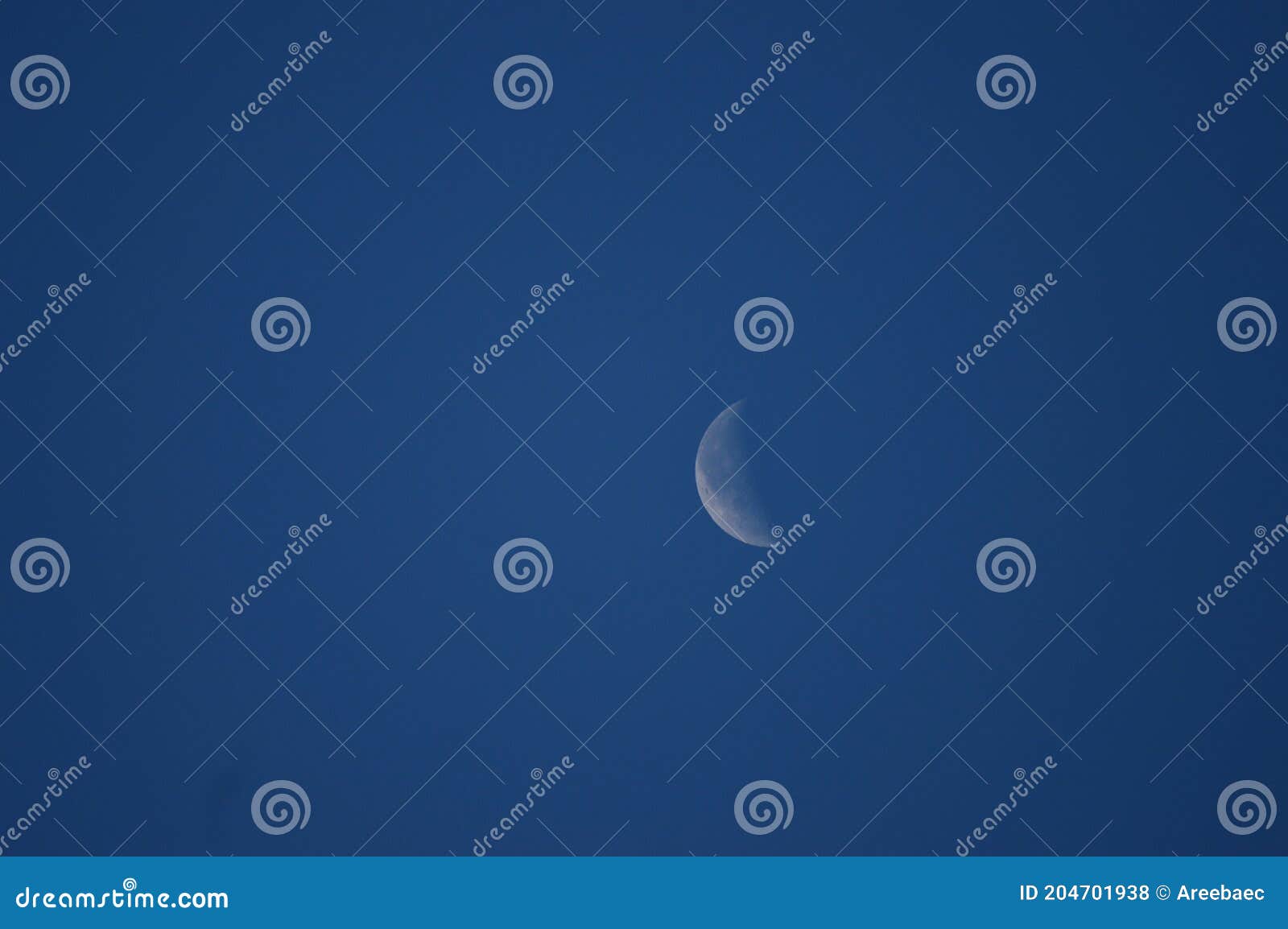 Half-moon on a blue sky stock photo. Image of morning - 204701938