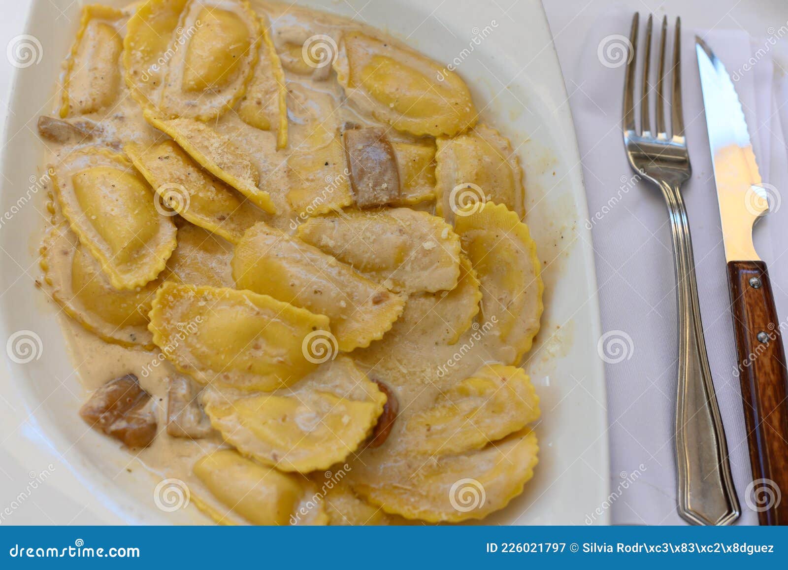 Half Moon Pasta Dish with Mushroom and Truffle Sauce Stock Image ...