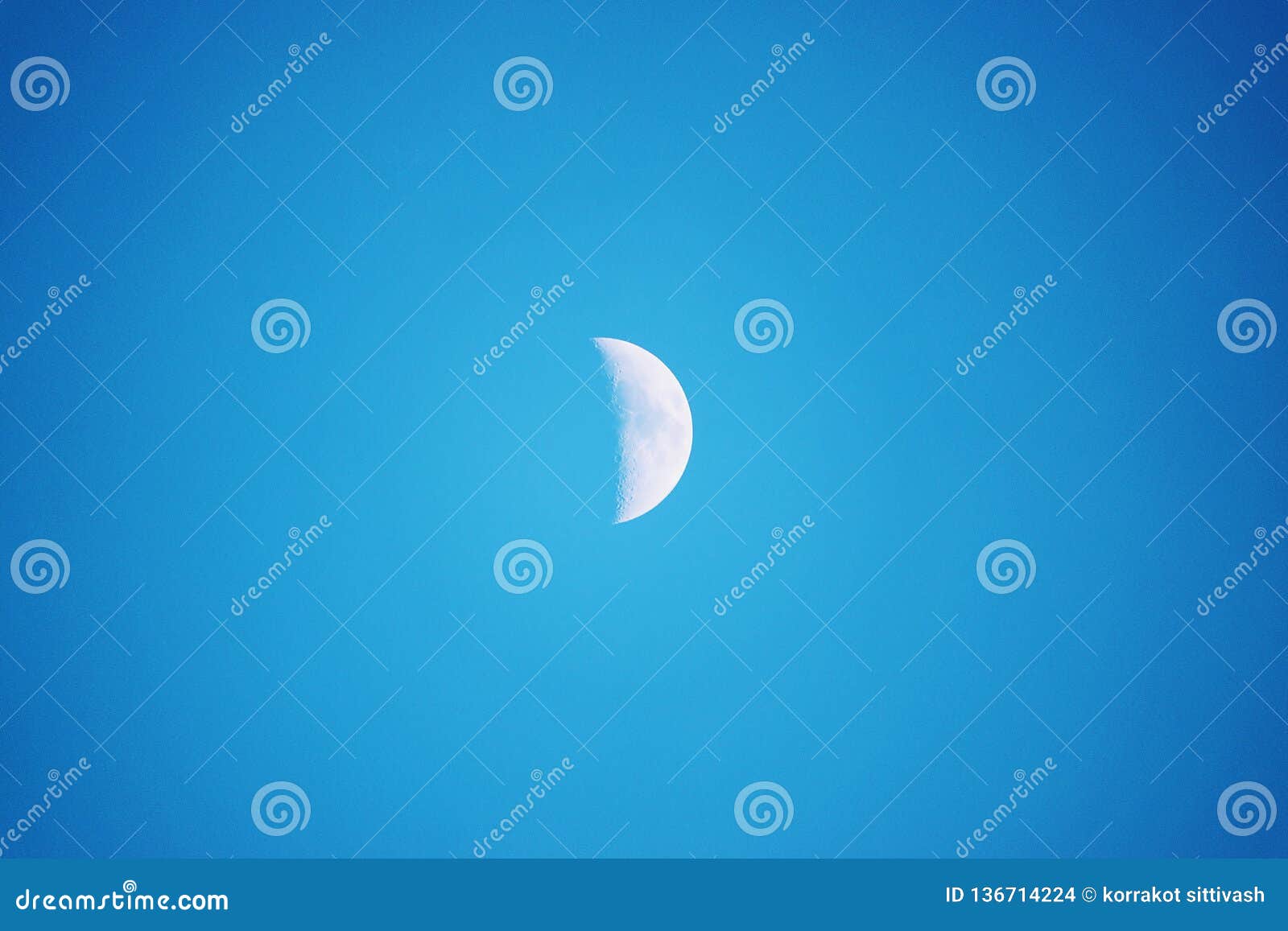 Half Moon Seen in the Daytime, in a Blue Sky Stock Photo - Image of ...