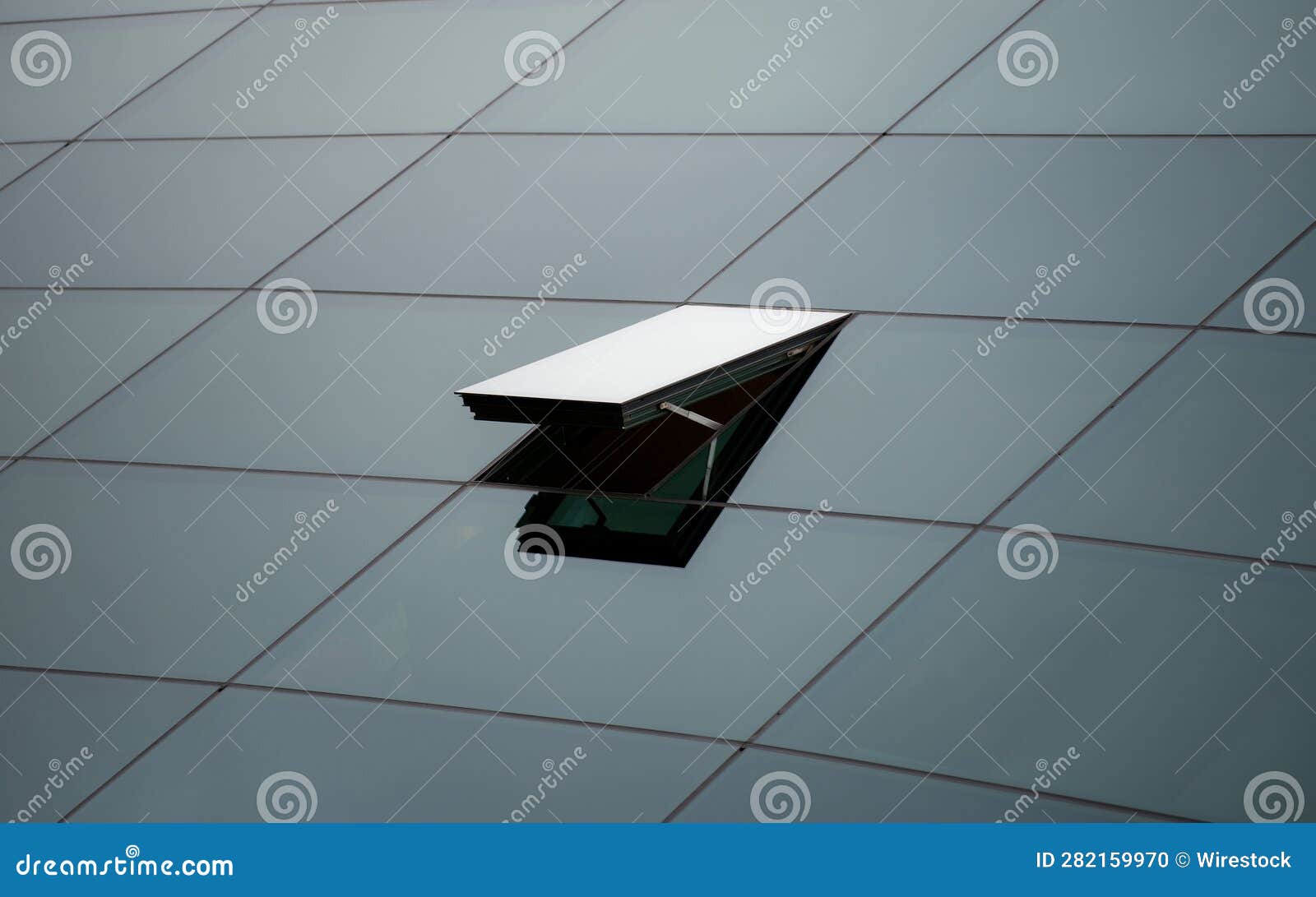 A Half-open Window on the Side of a Building, Surrounded by a Modern ...